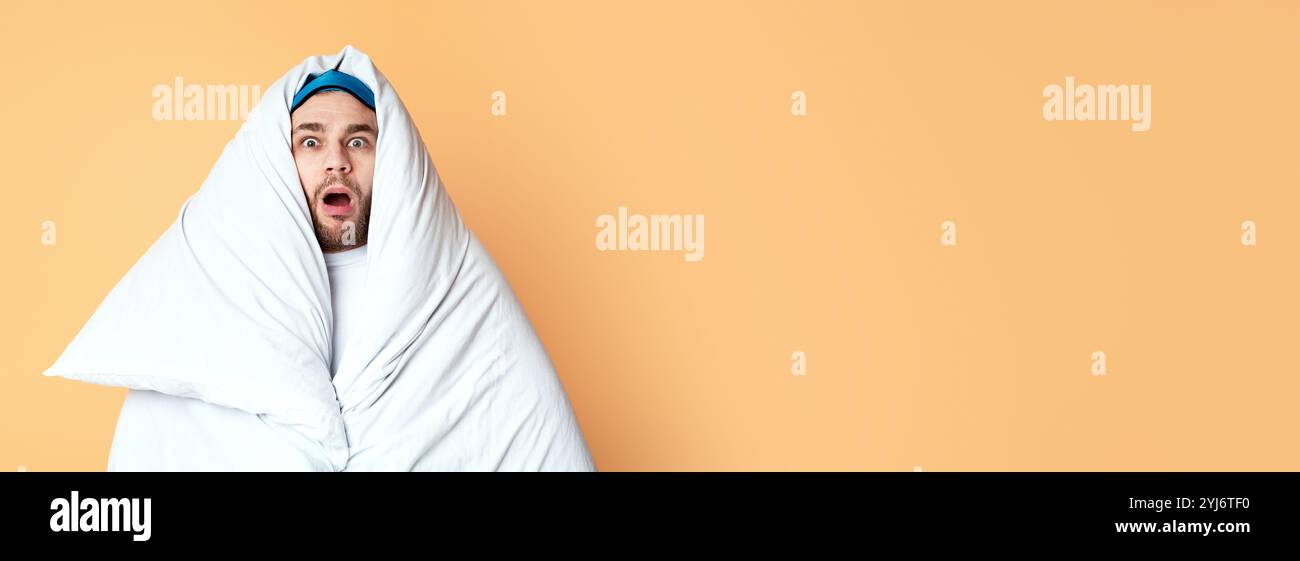 Shocked man in blanket scared. Quarantine, stay at home Stock Photo - Alamy