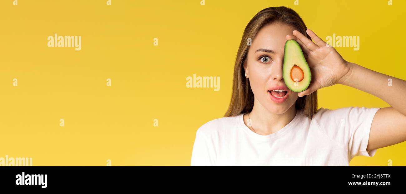 Healthy Benefits Of Avocado. Young Lady Holding Tropical Fruit Half ...