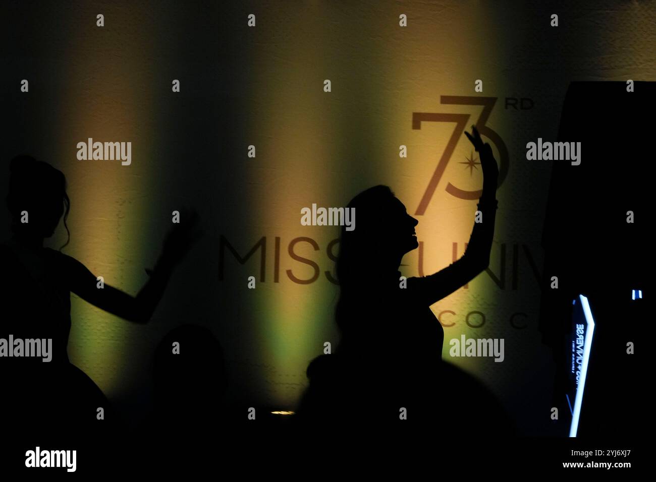 A Miss Universe Beauty Pageant contestant waves during a media ...