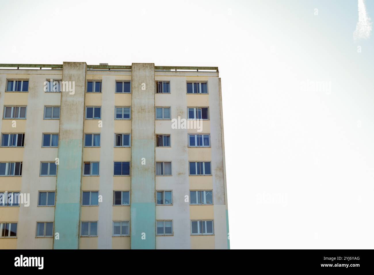 High rise apartment building in bad state of repair Stock Photo - Alamy