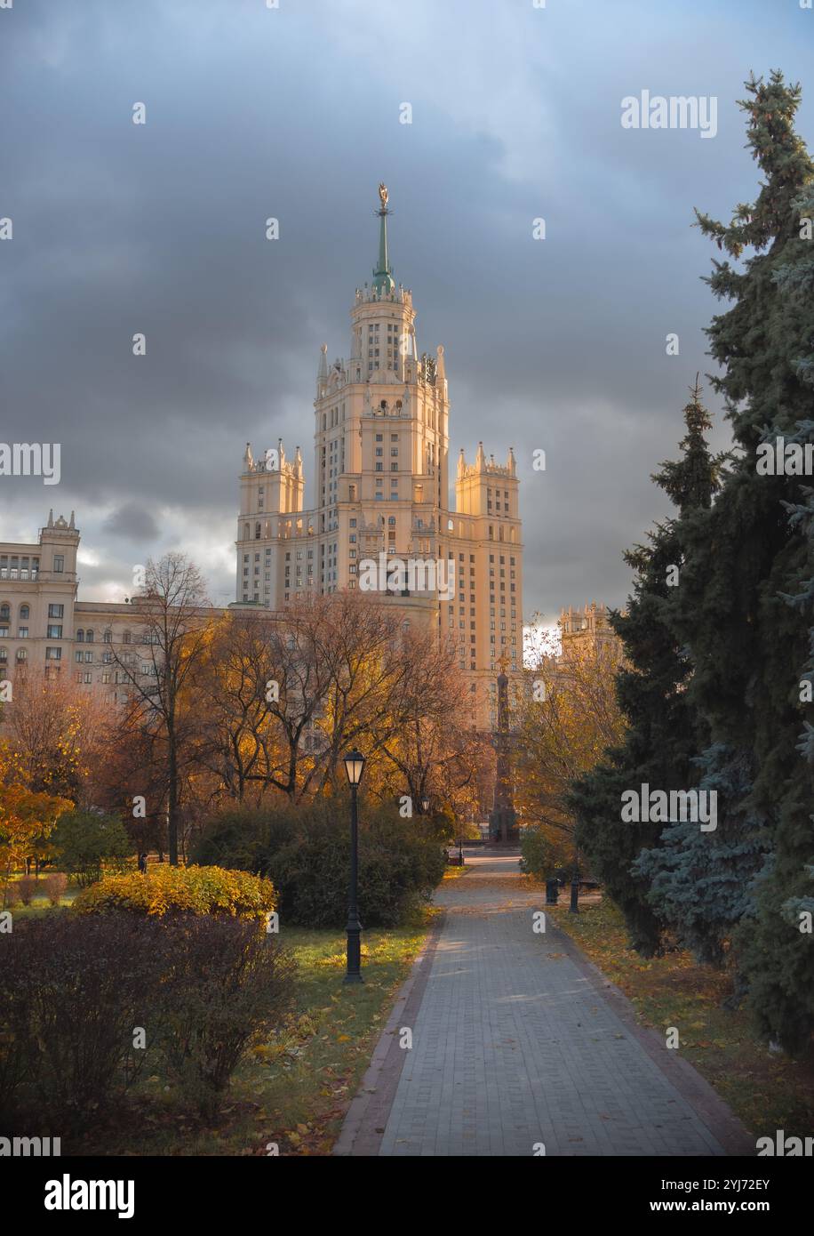 High-rise building against trees in city, autumn city landscape on ...