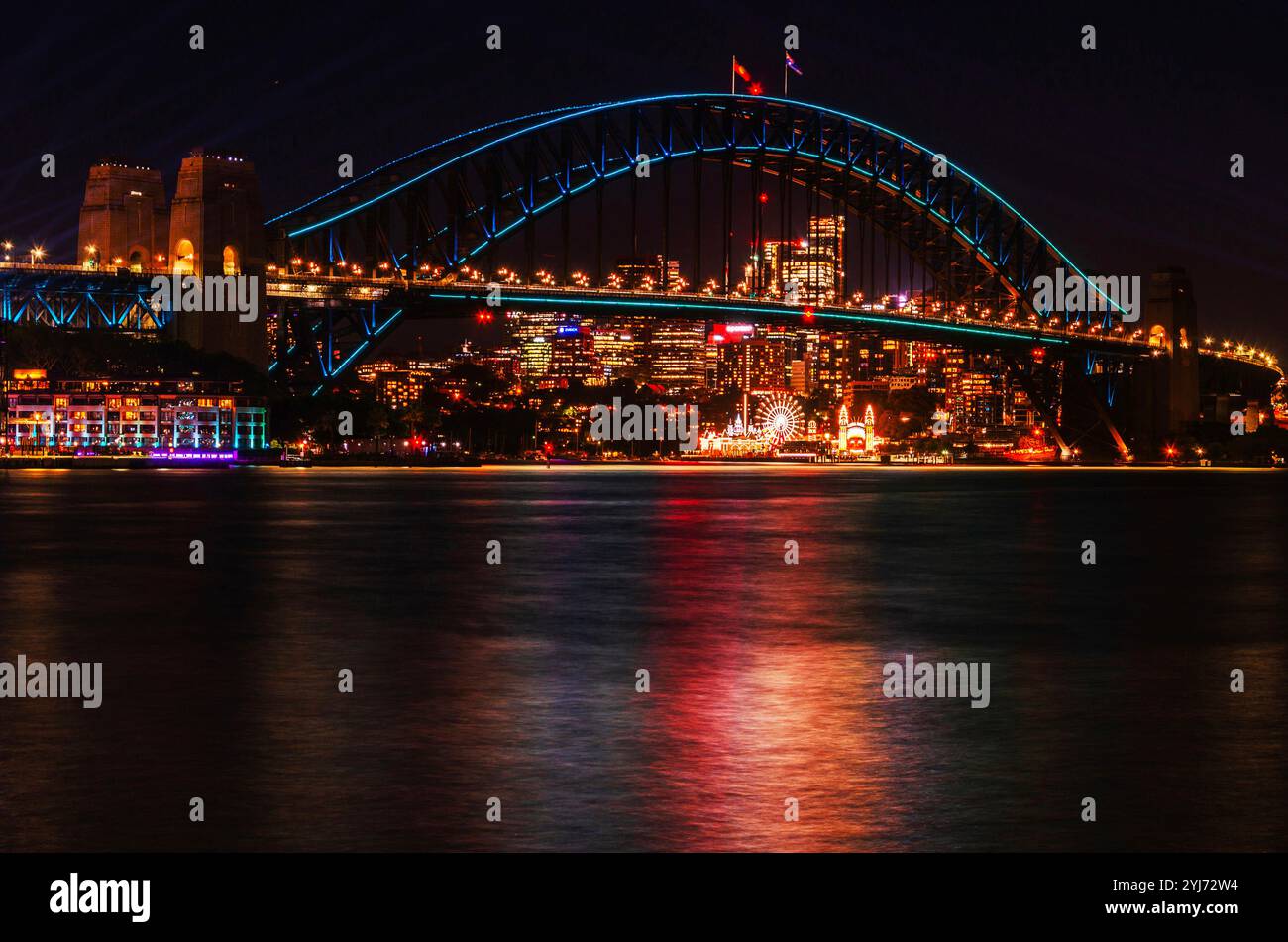 Night view of illuminated Sydney Harbor Bridge. The bridge was opened ...
