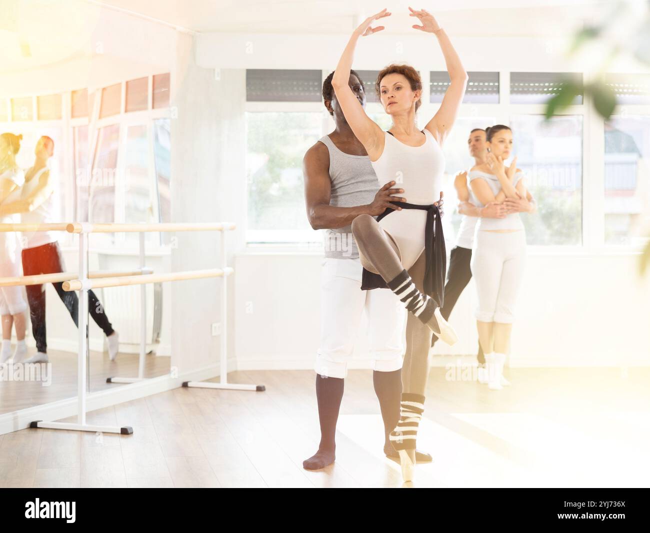 Adult man and adult woman rehearsing pair ballet Stock Photo - Alamy