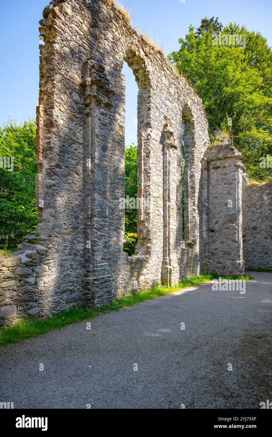 Remnants of the Hoerbrunn Church stand amidst lush greenery in ...