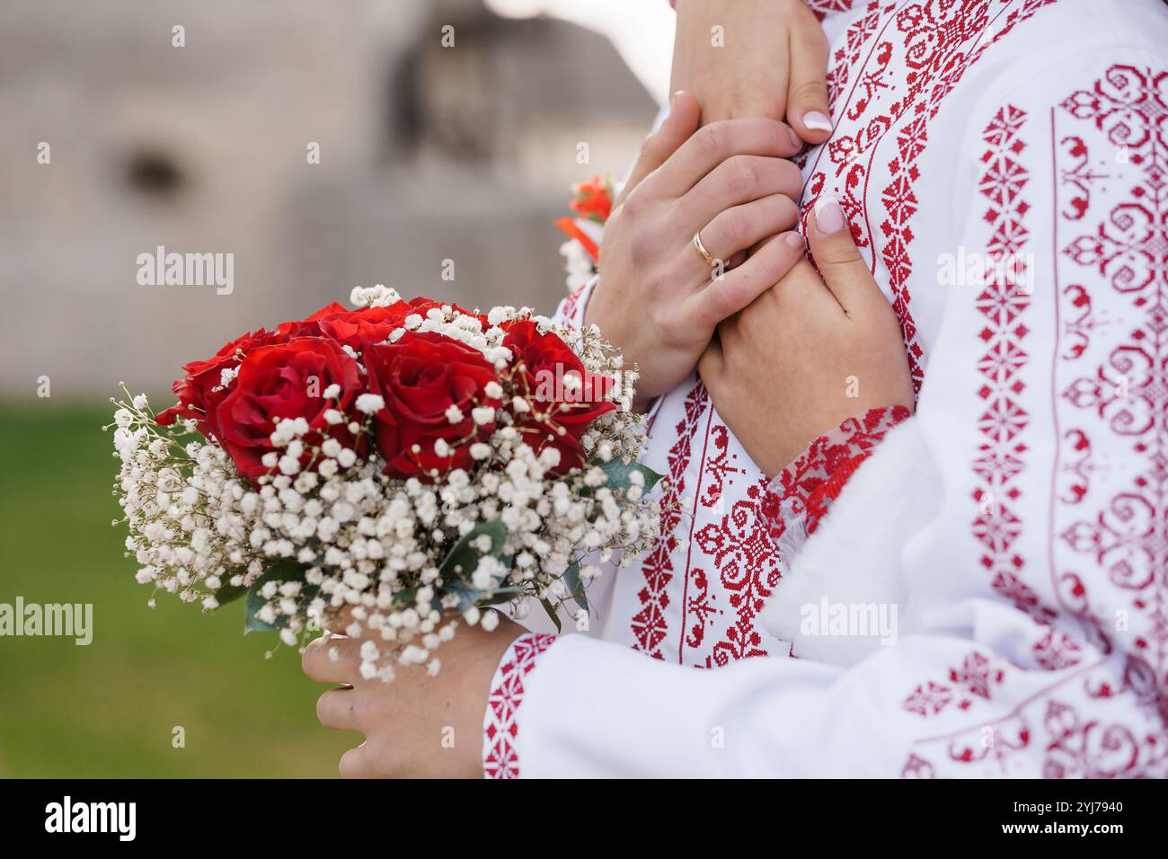 Romantic Couple Celebrating Their Love in Traditional Attire with Red ...