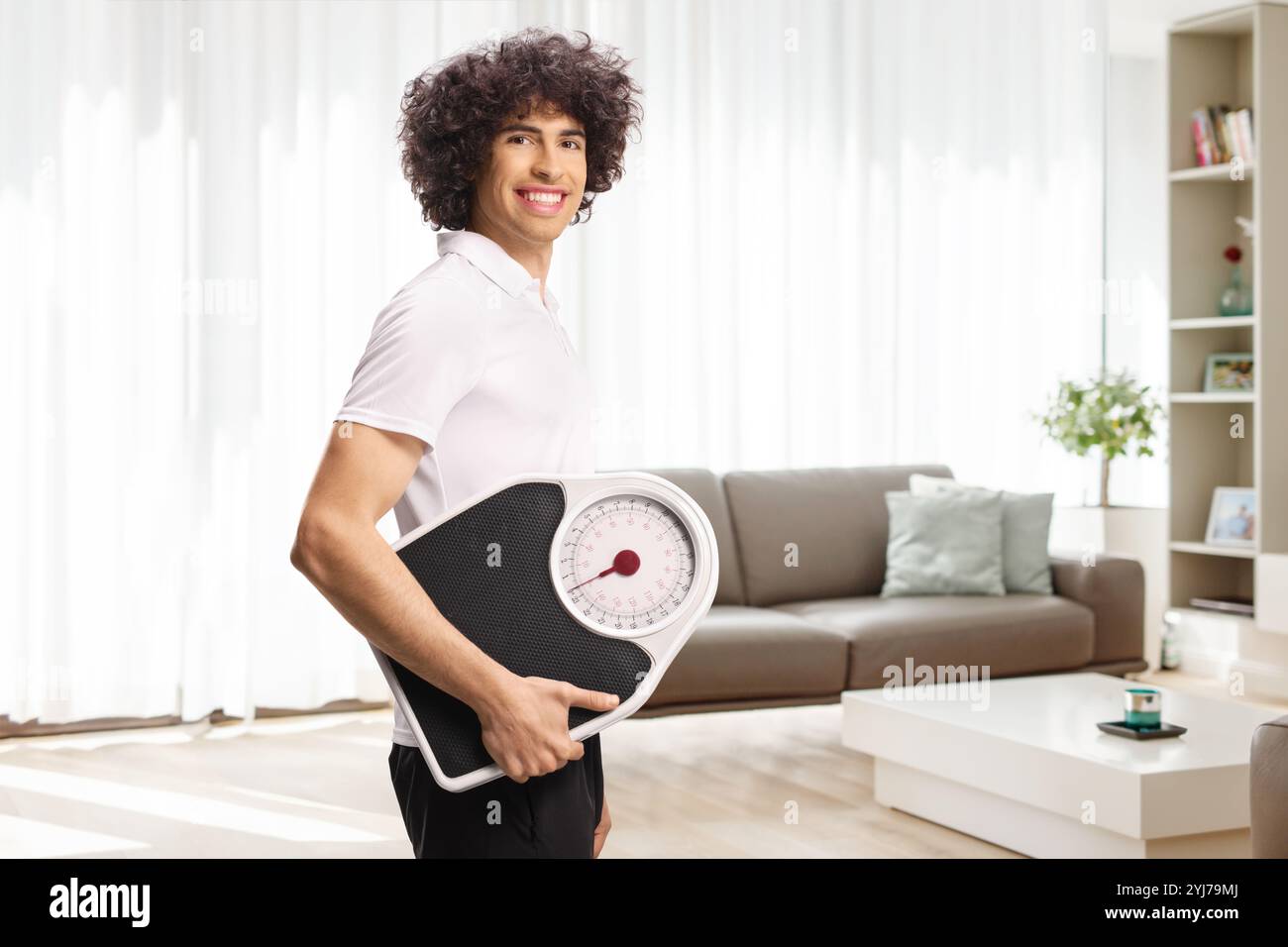 Healthy young man holding hi-res stock photography and images - Alamy