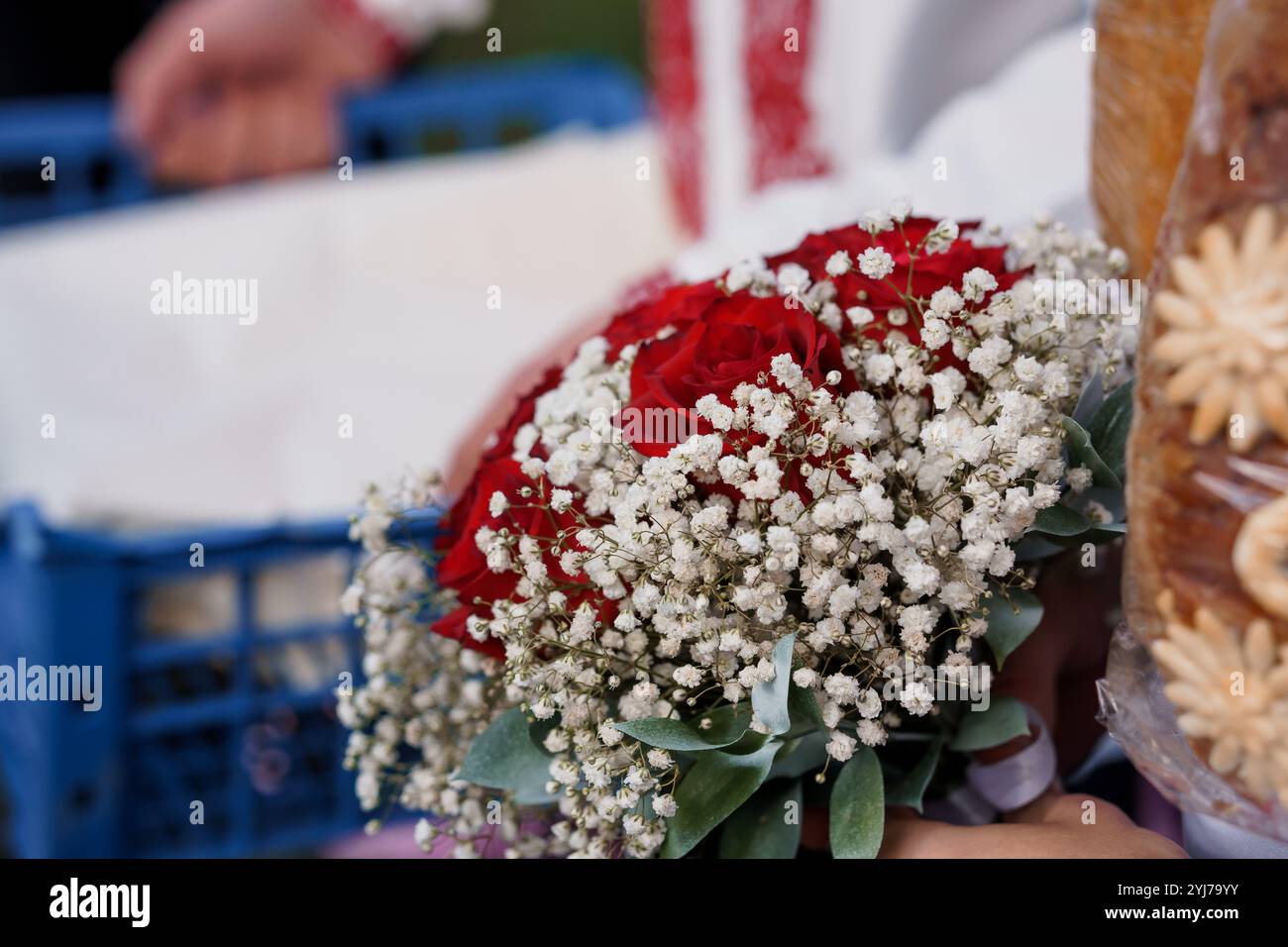 Elegant Floral Bouquet with Red Roses and Baby's Breath Stock Photo - Alamy