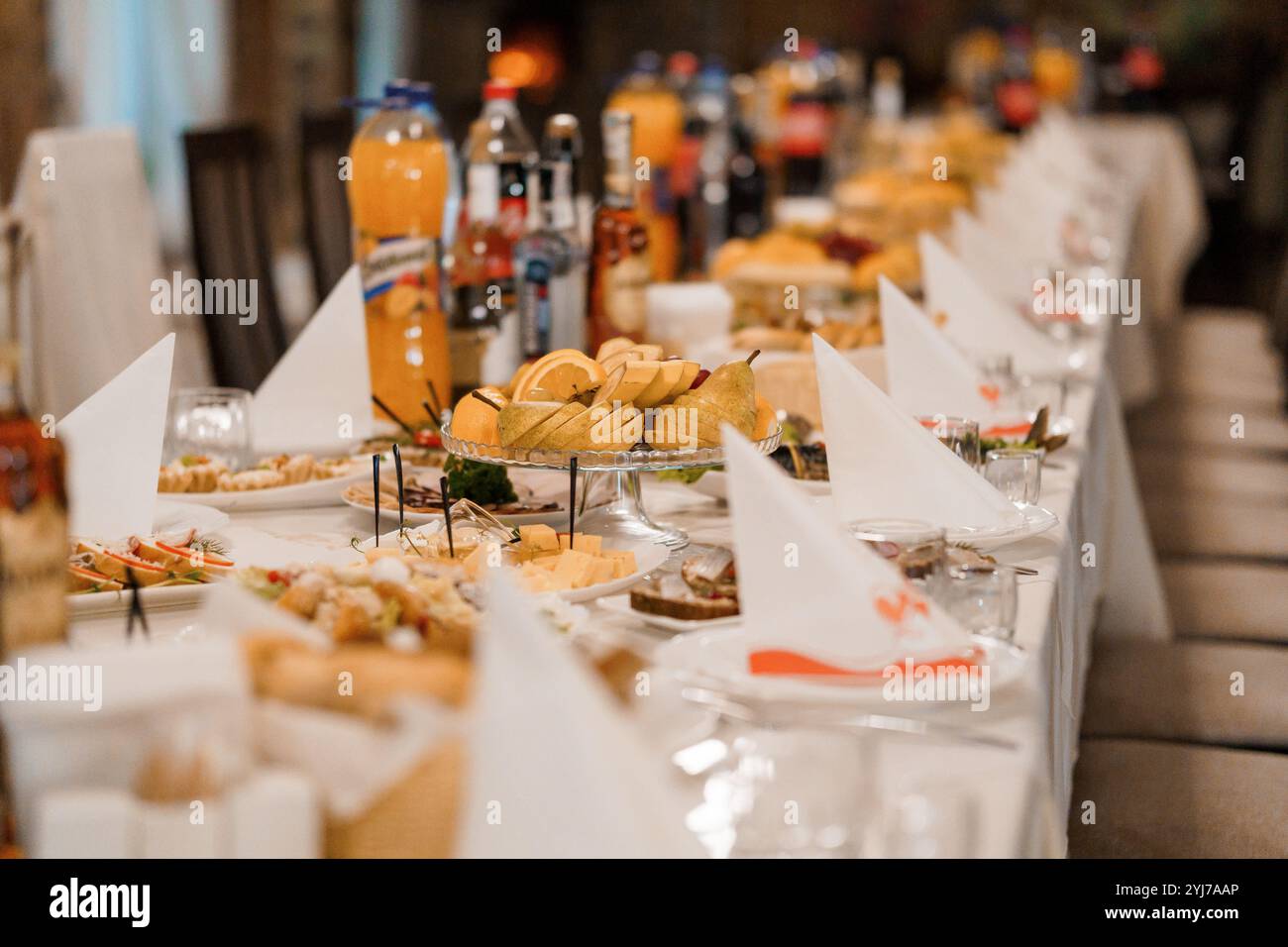 Lavish Banquet Table Set with Assorted Dishes and Beverages Stock Photo - Alamy