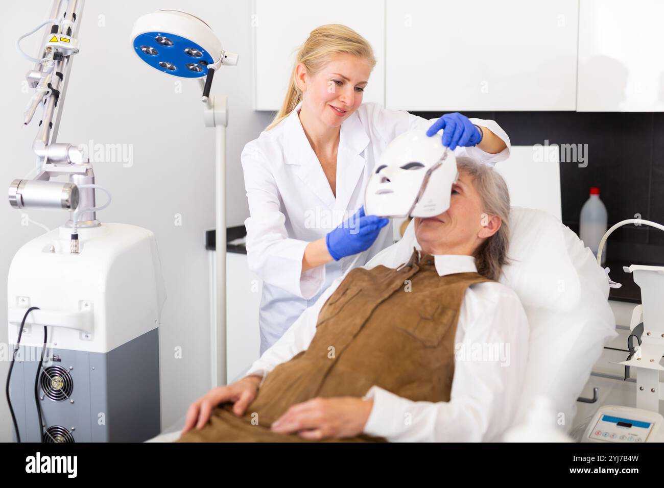 Cosmetologist working patient using hi-res stock photography and images ...