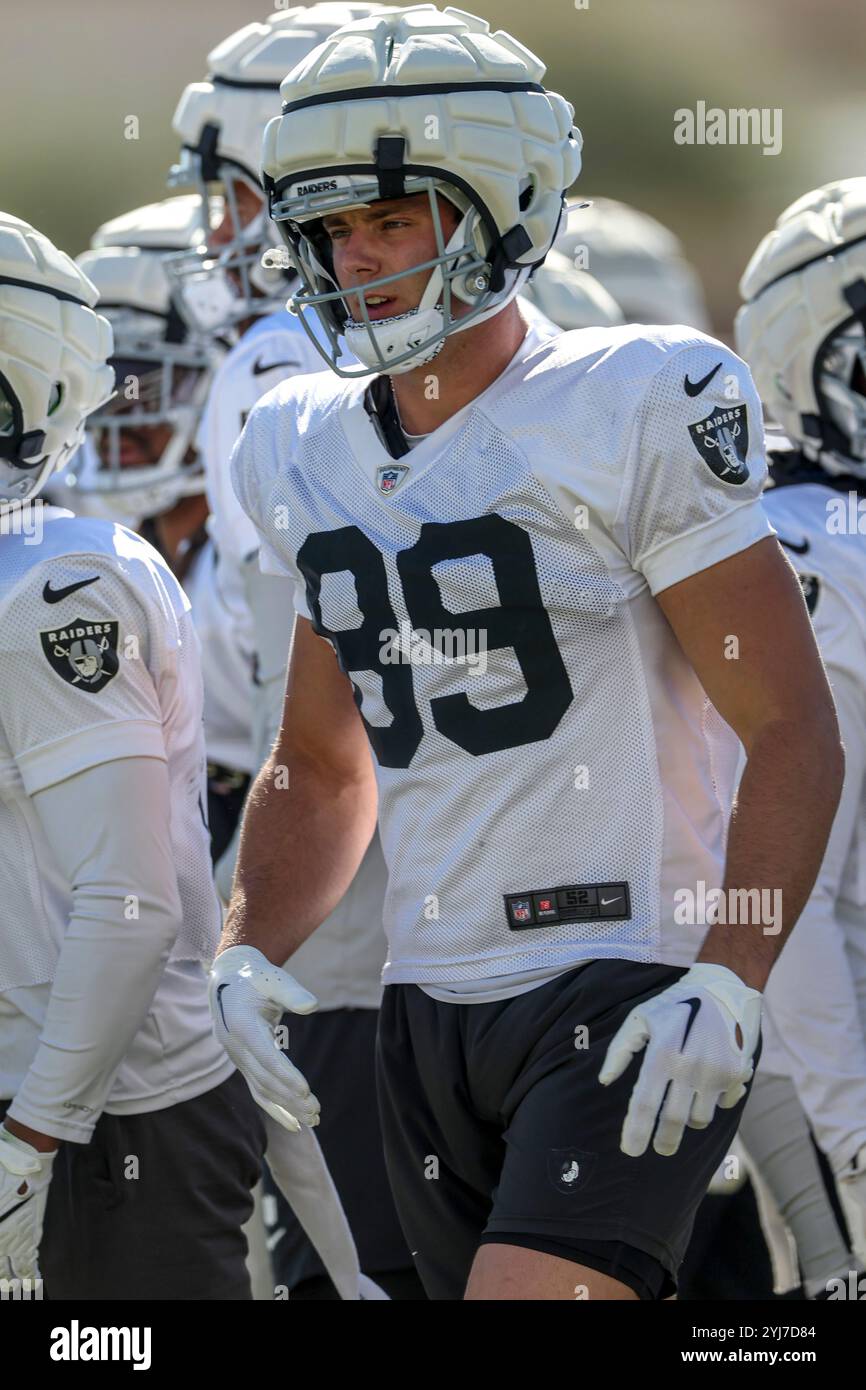 Henderson, NV USA; Las Vegas Raiders tight end Brock Bowers (89) stretches during practice for ...