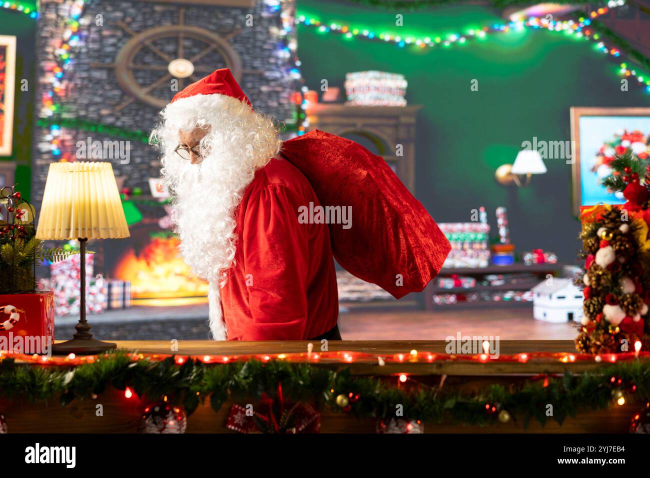 Father Christmas taking his sack filled with presents and toys ...