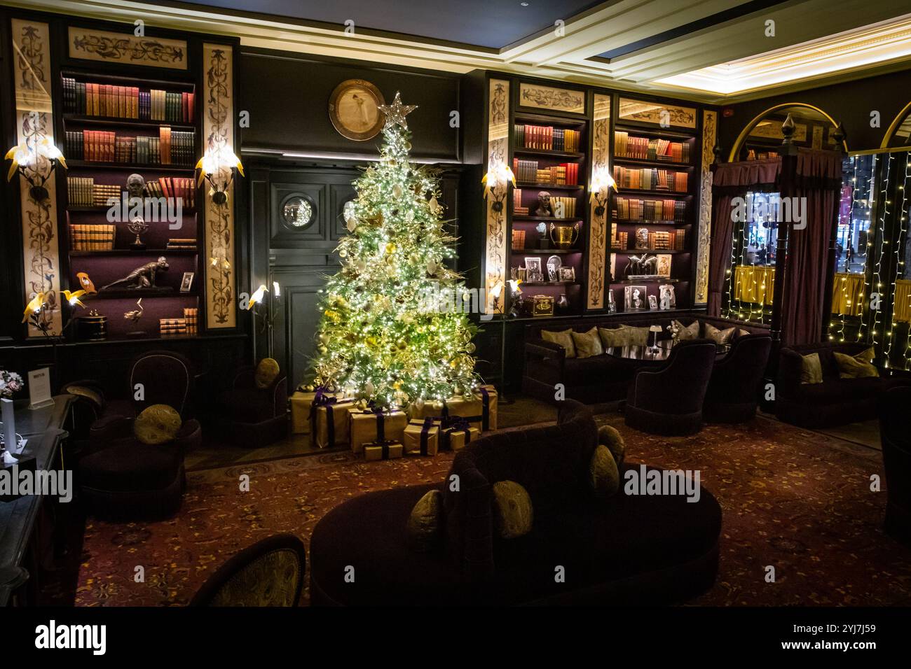 Reception of L'oscar hotel, London, with Christmas tree Stock Photo - Alamy