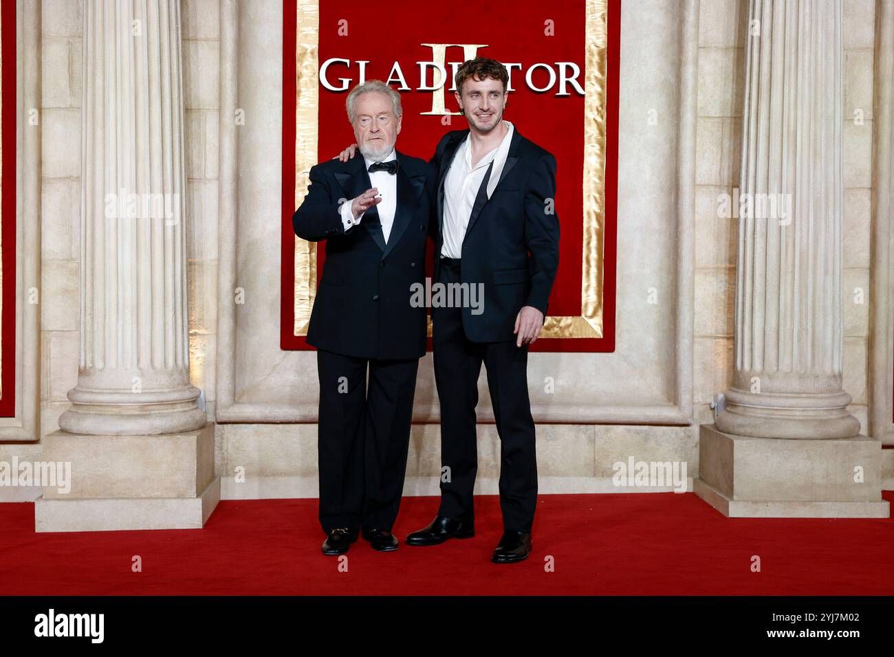 Director Ridley Scott, left, and Paul Mescal pose for photographers ...