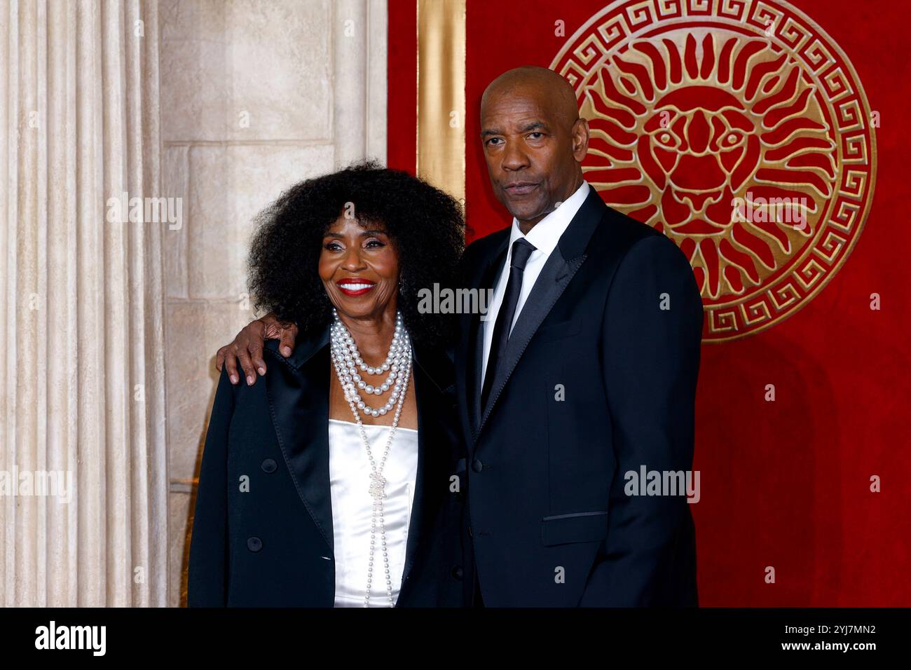 Pauletta Washington, left, and Denzel Washington pose for photographers ...