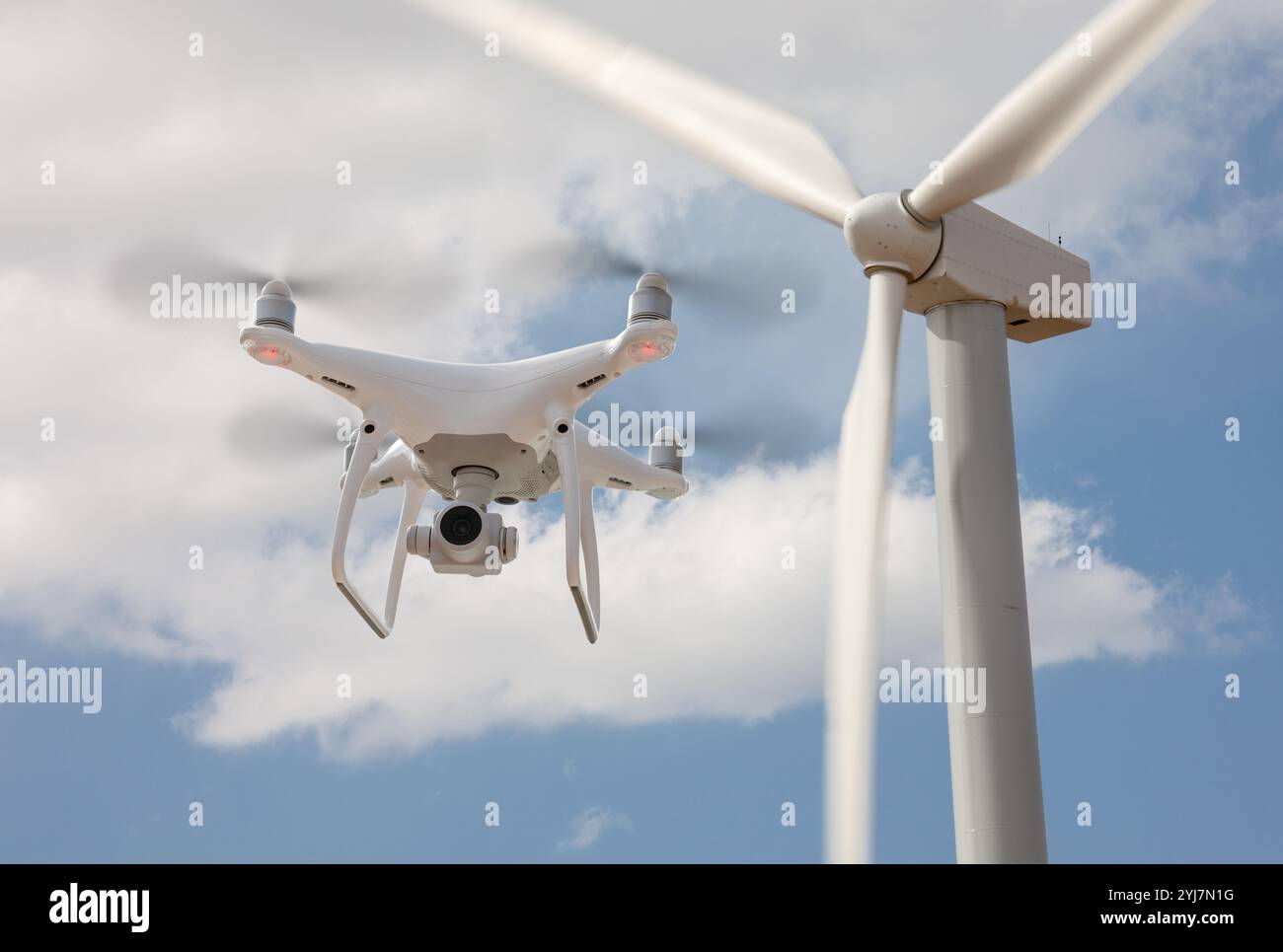 Unmanned Aircraft System (UAV) Quadcopter Drone In The Air Surveying ...