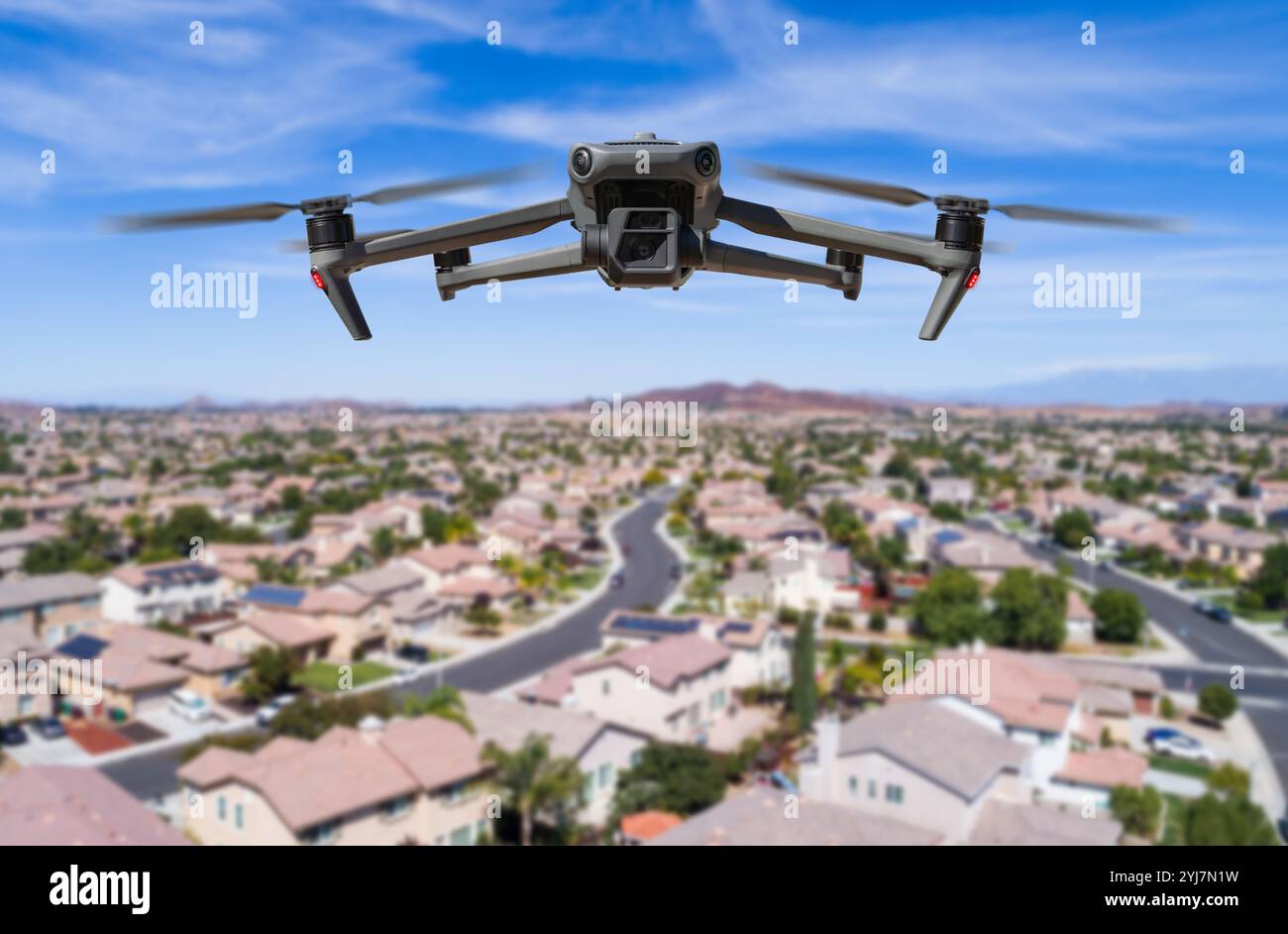 Unmanned Aircraft System (UAV) Quadcopter Drone In The Air Over ...