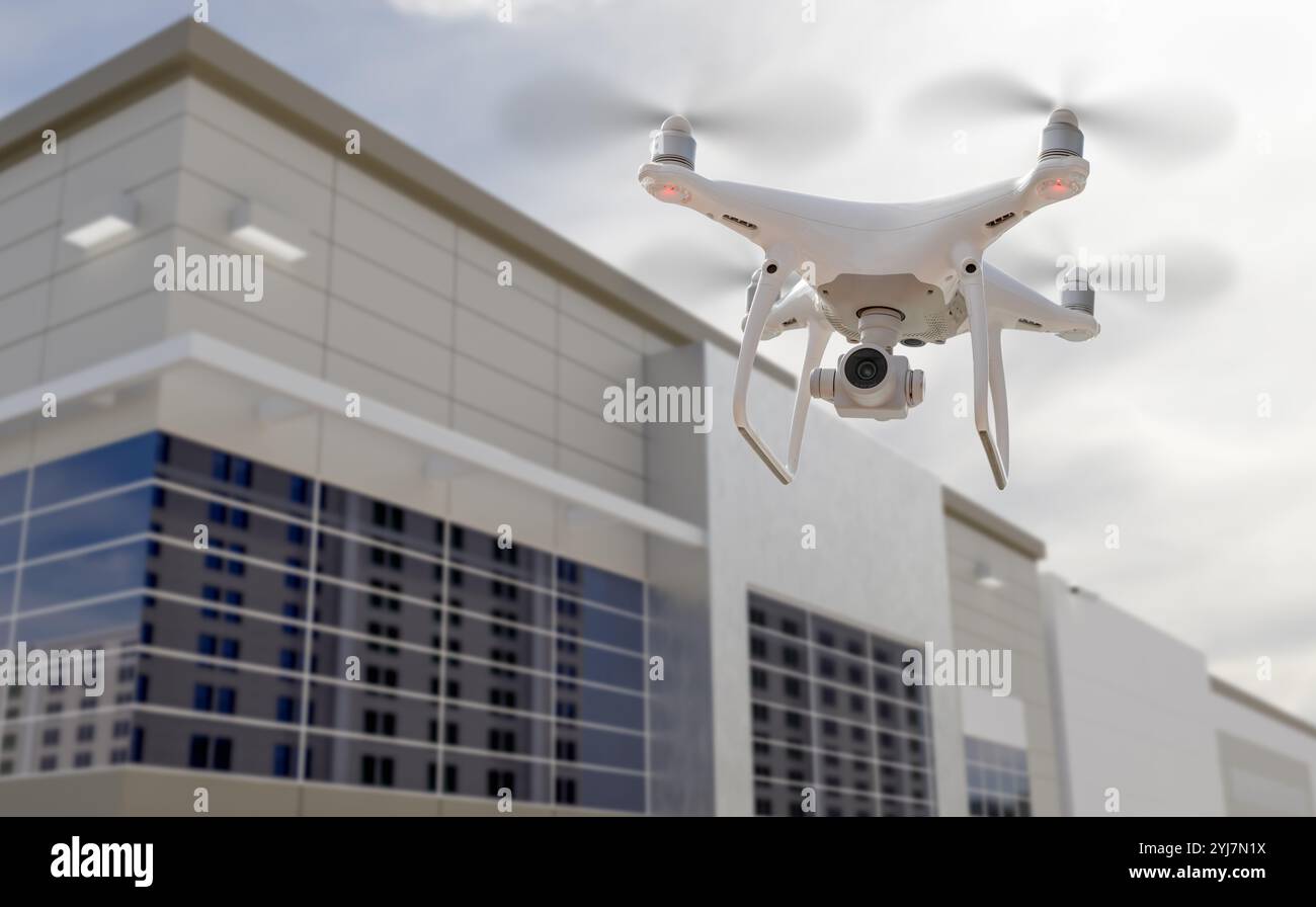 Unmanned Aircraft System Quadcopter Drone UAV In The Air Near Corporate ...