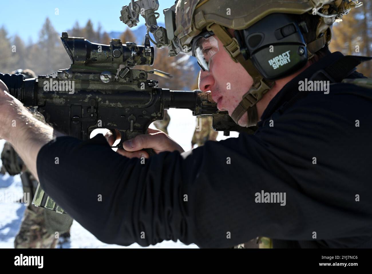 A U.S. Army paratrooper assigned to 173rd Airborne Brigade, engages targets with an M4 carbine ...