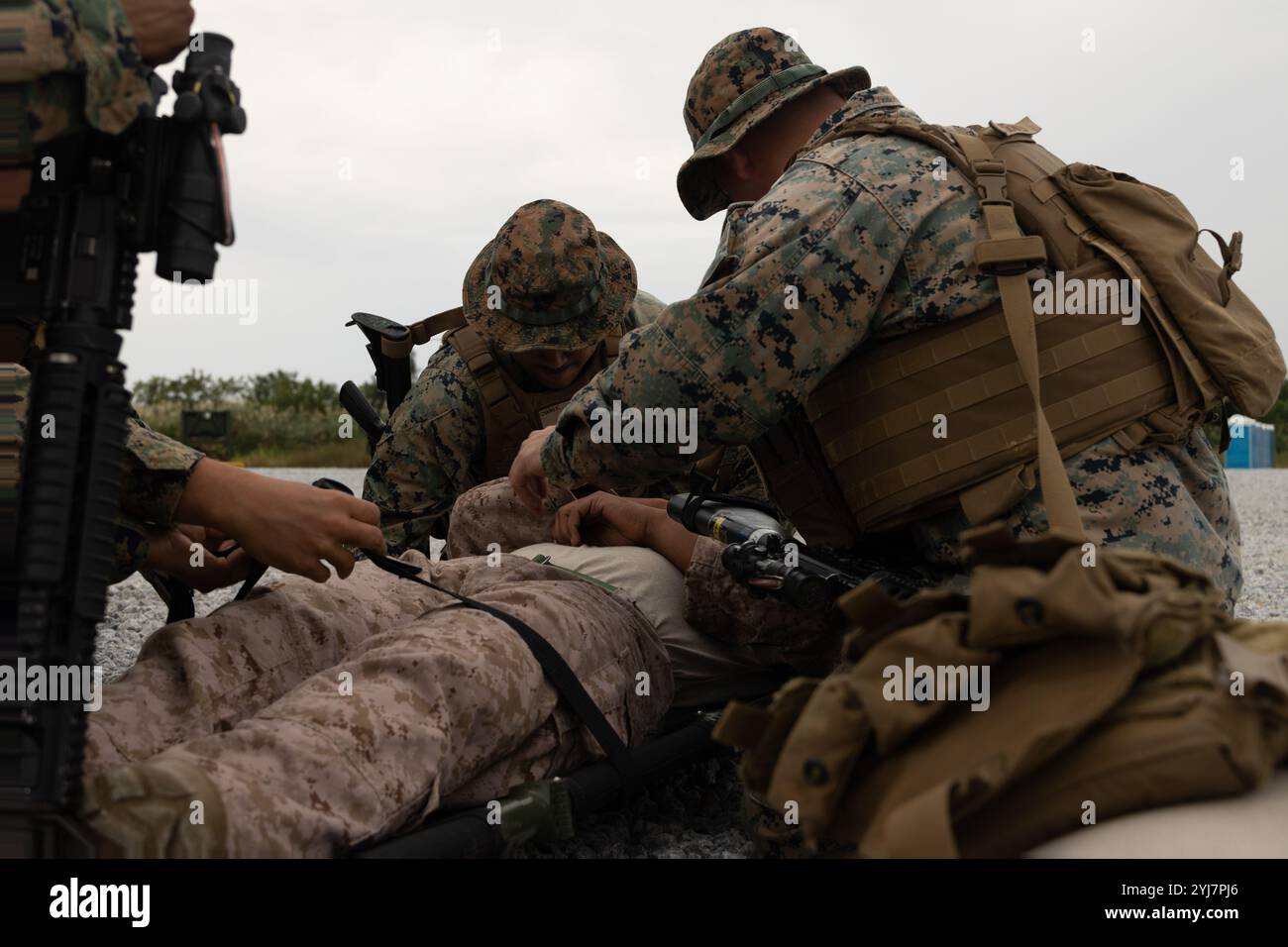 U.S. Navy corpsmen and Marines with Combat Logistics Battalion 31, 31st ...