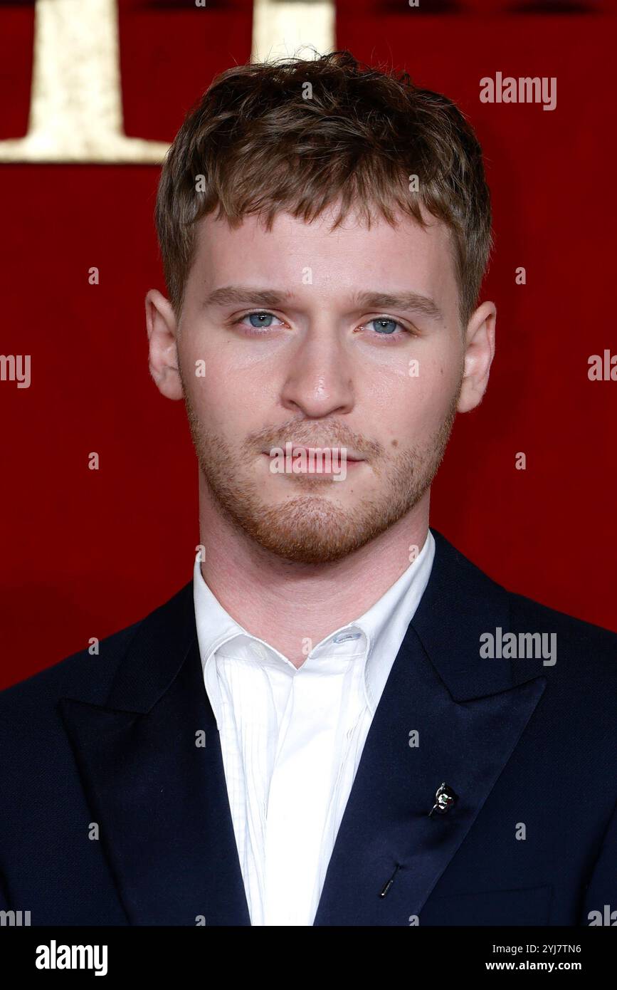 Fred Hechinger poses for photographers upon arrival at the premiere of ...