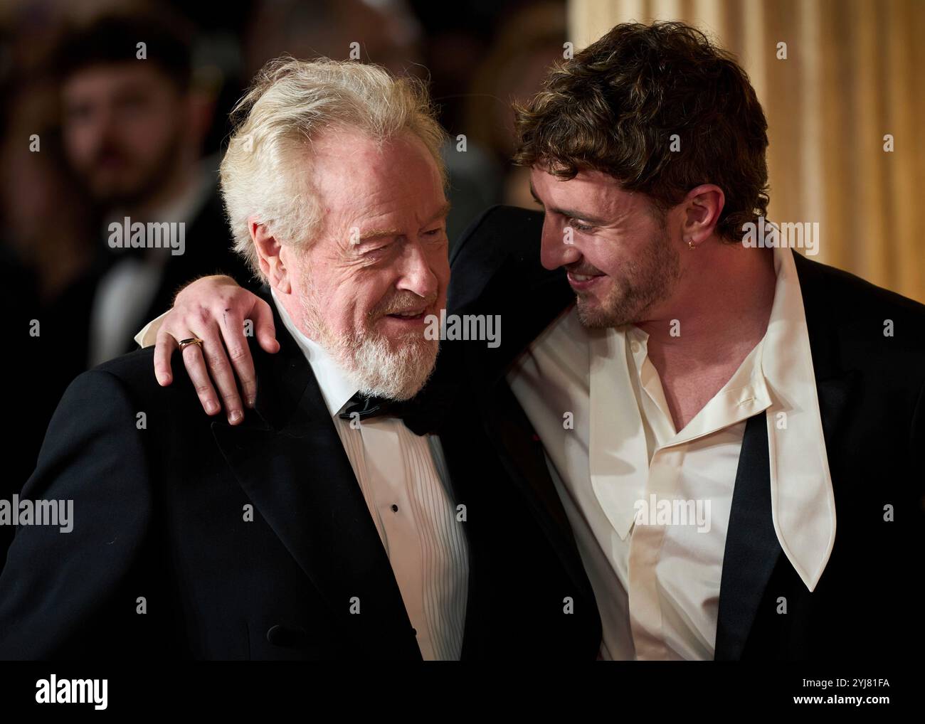 Director Ridley Scott, left, and Paul Mescal pose for photographers ...