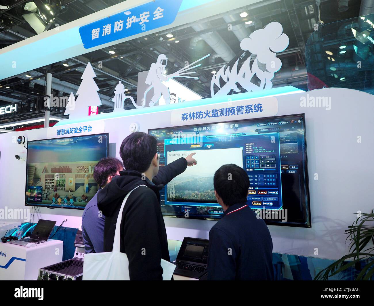 Visitors visit the "Forest Fire Monitoring and early Warning System" at ...