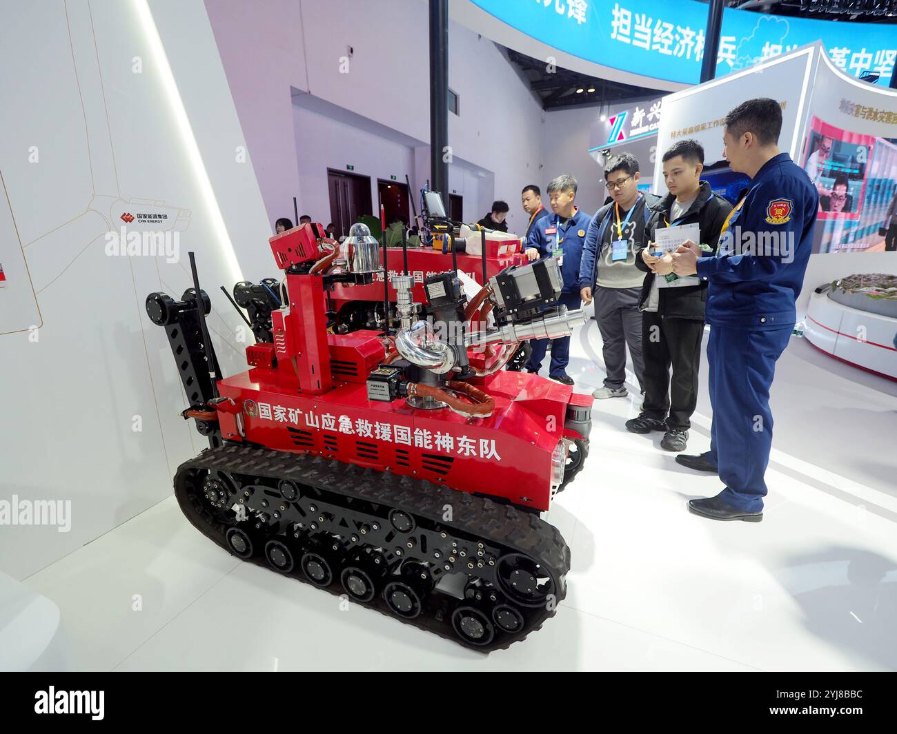 Visitors visit a "Coal mine fire fighting robot" at the 2024 China ...