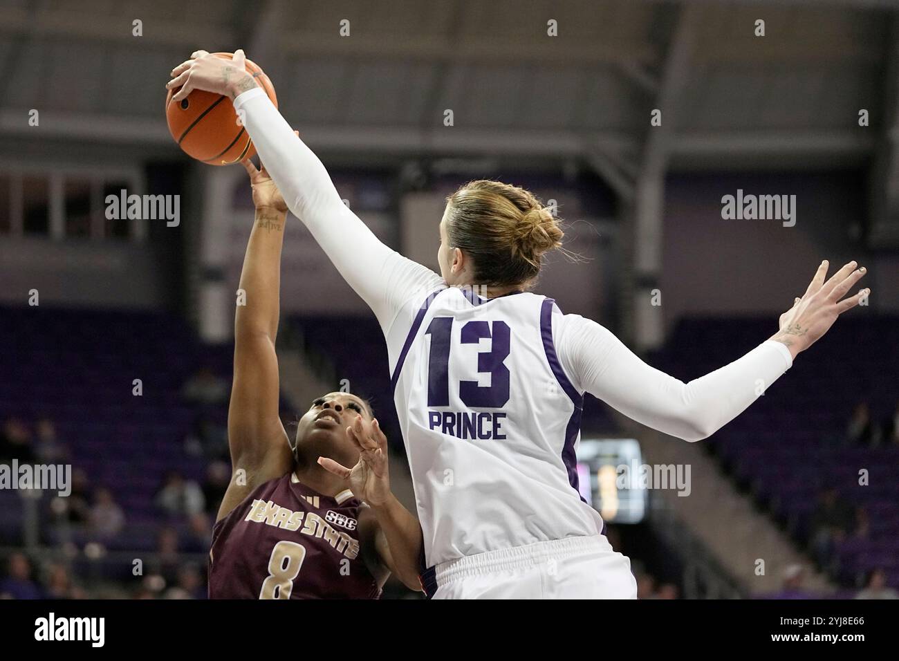 Texas State guard Ja'Mia Harris (8) has her shot blocked by TCU center ...