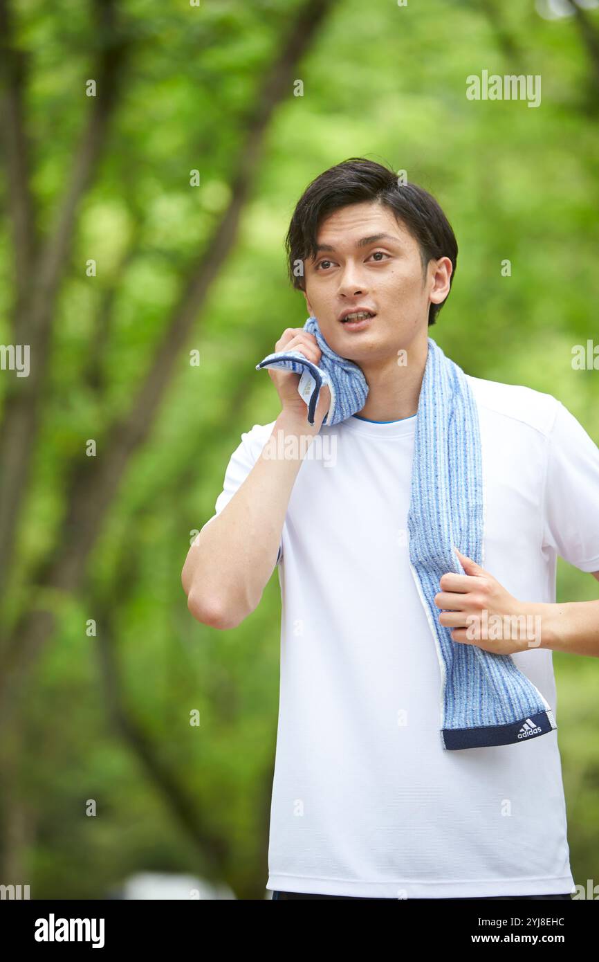 Man wiping sweat hi-res stock photography and images - Alamy