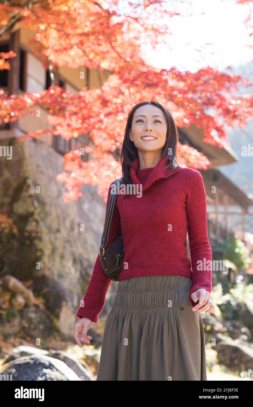 Women enjoying autumn leaf peeping Stock Photo - Alamy