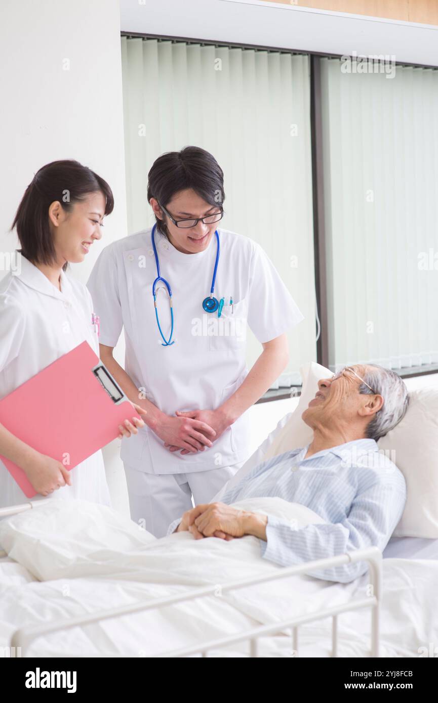 Doctor nurse examining patient in hi-res stock photography and images ...