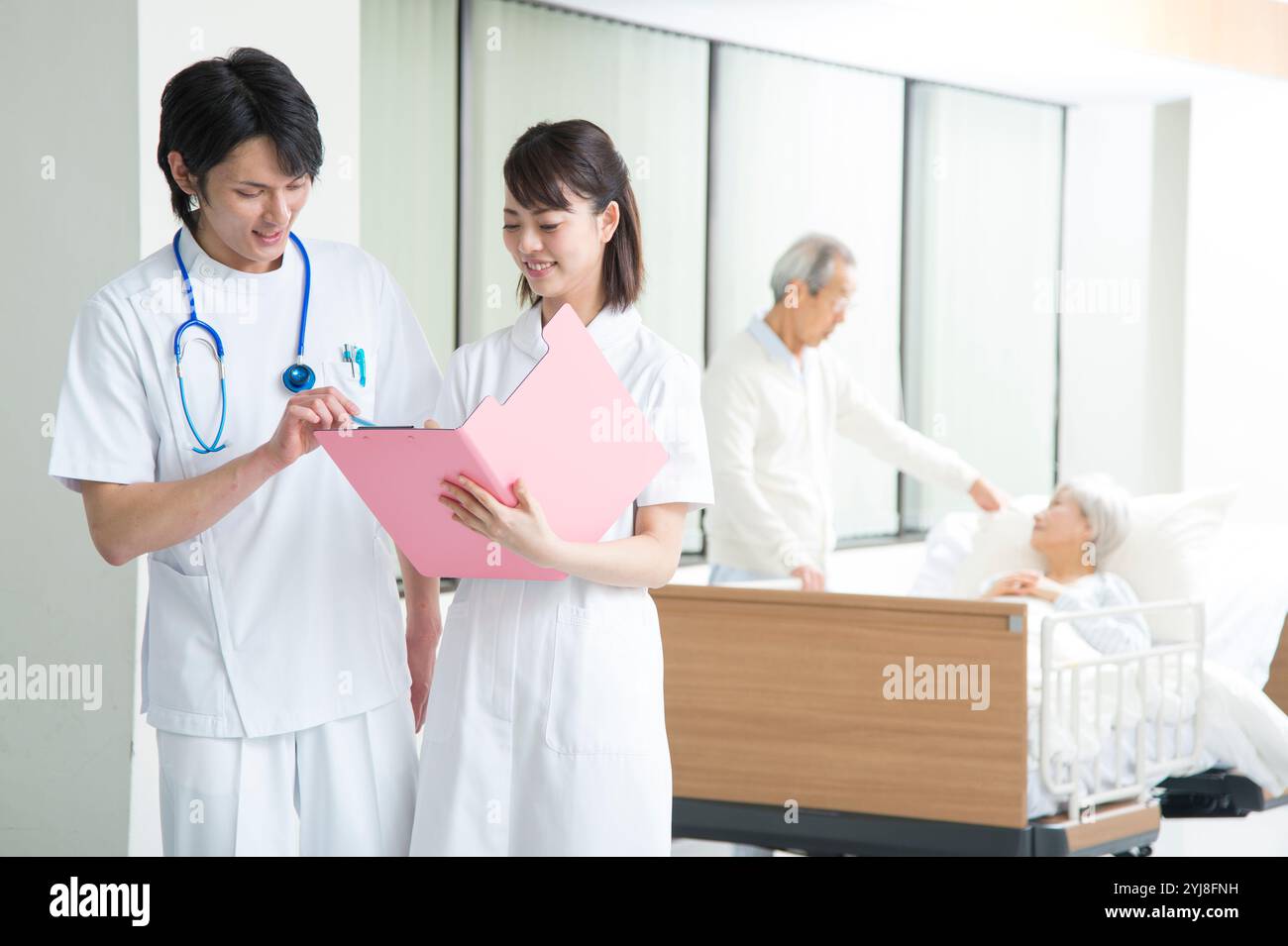 Hospitalised senior patient, doctor and nurse Stock Photo - Alamy