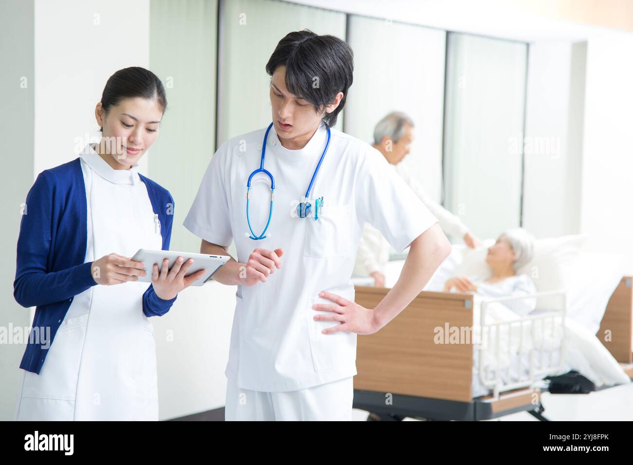 Hospitalised senior patient, doctor and nurse Stock Photo - Alamy