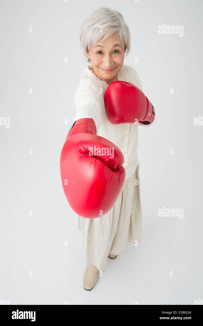 Senior woman boxing Stock Photo - Alamy