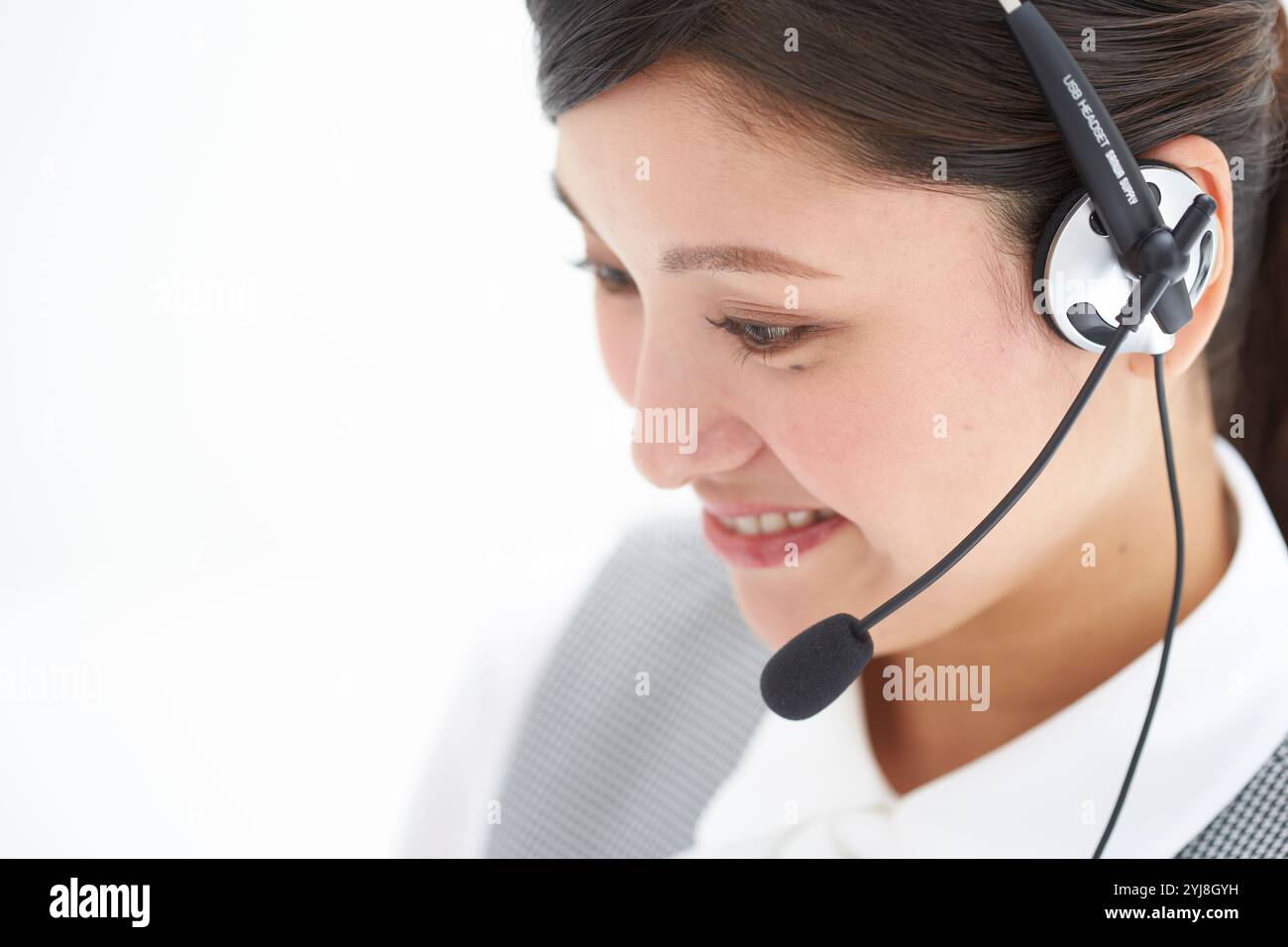 Operator woman with intercom Stock Photo - Alamy