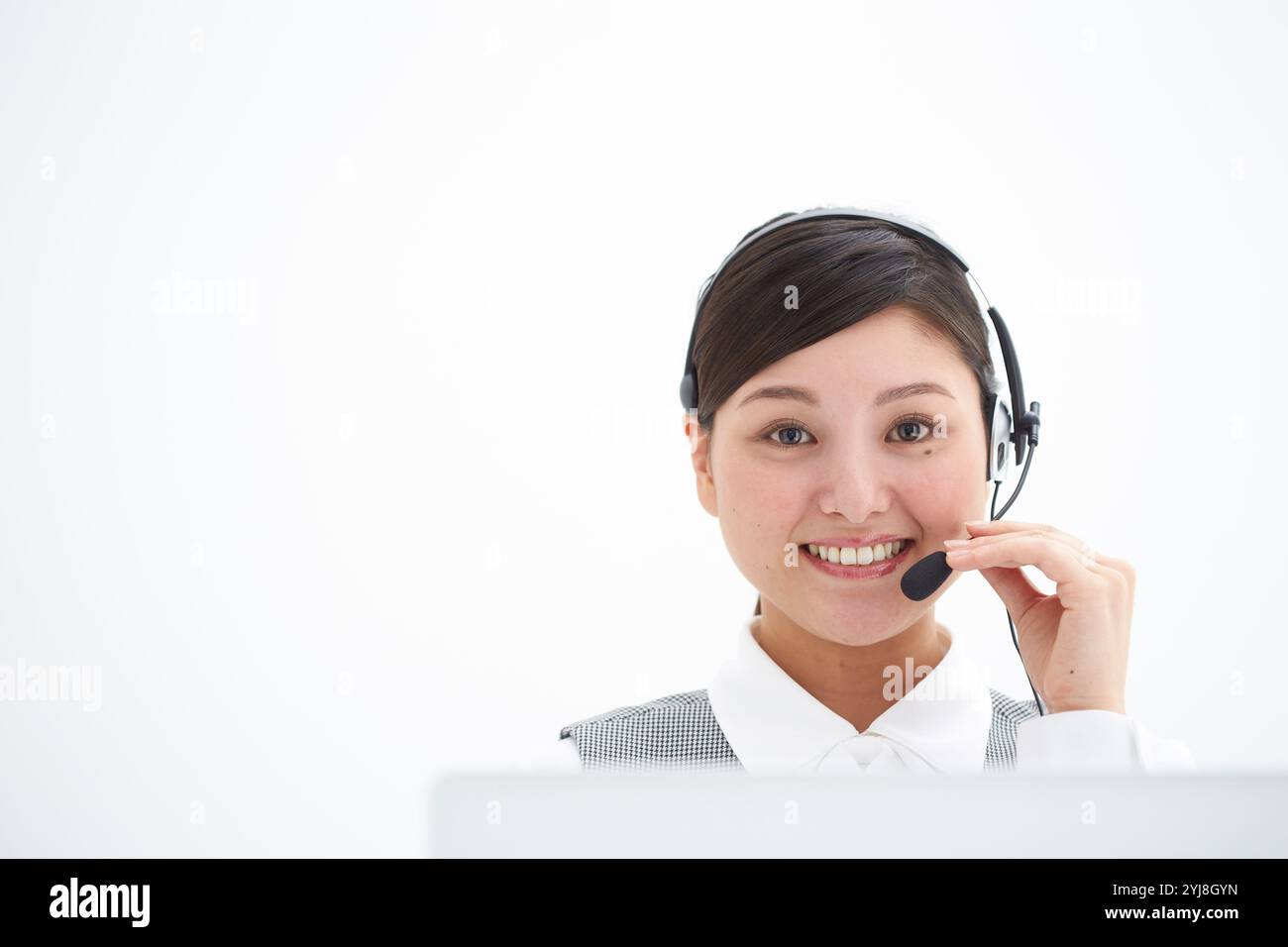Operator woman with intercom Stock Photo - Alamy