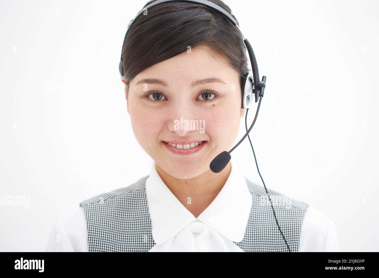 Operator woman with intercom Stock Photo - Alamy