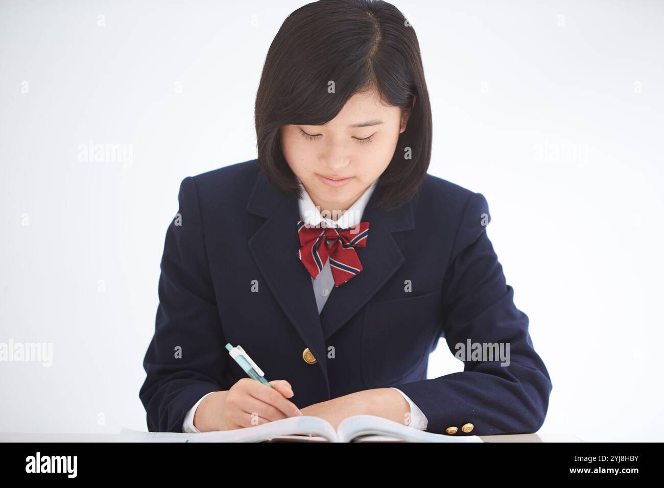 Female high school students in class Stock Photo - Alamy