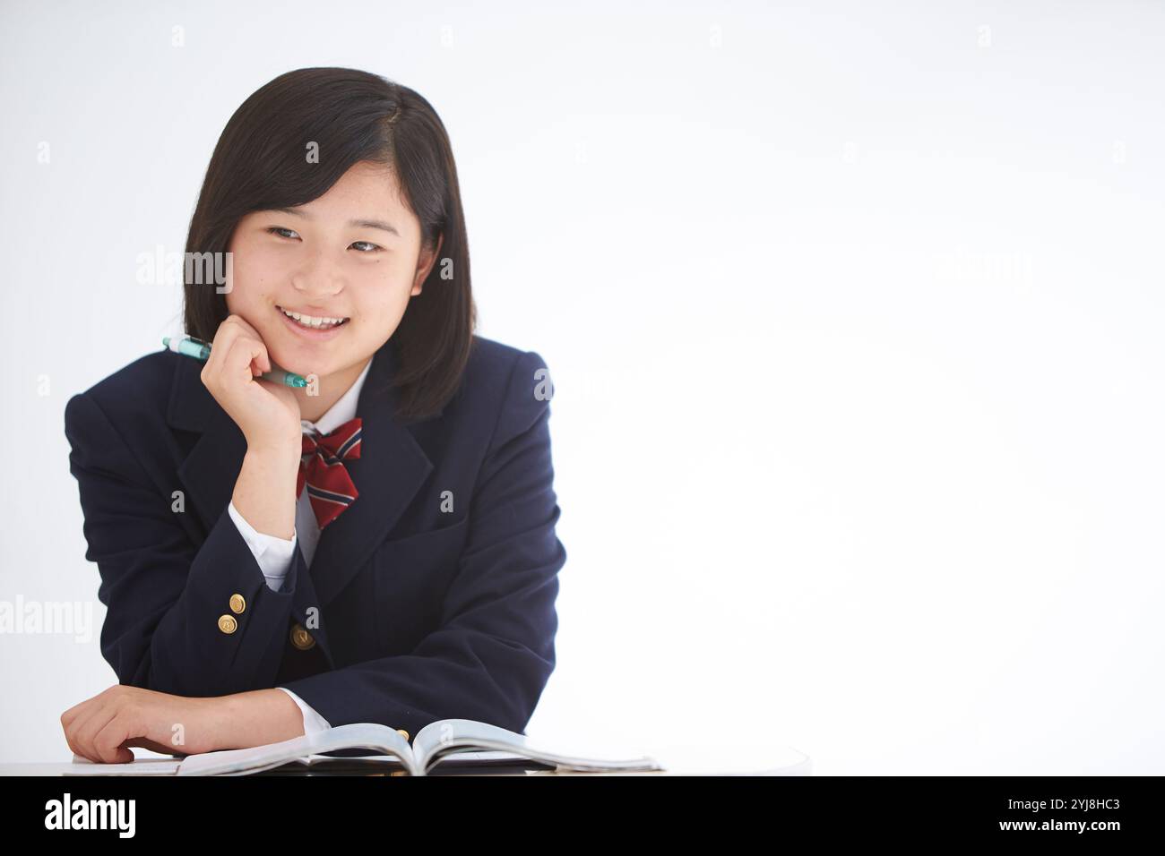 Female high school students in class Stock Photo - Alamy
