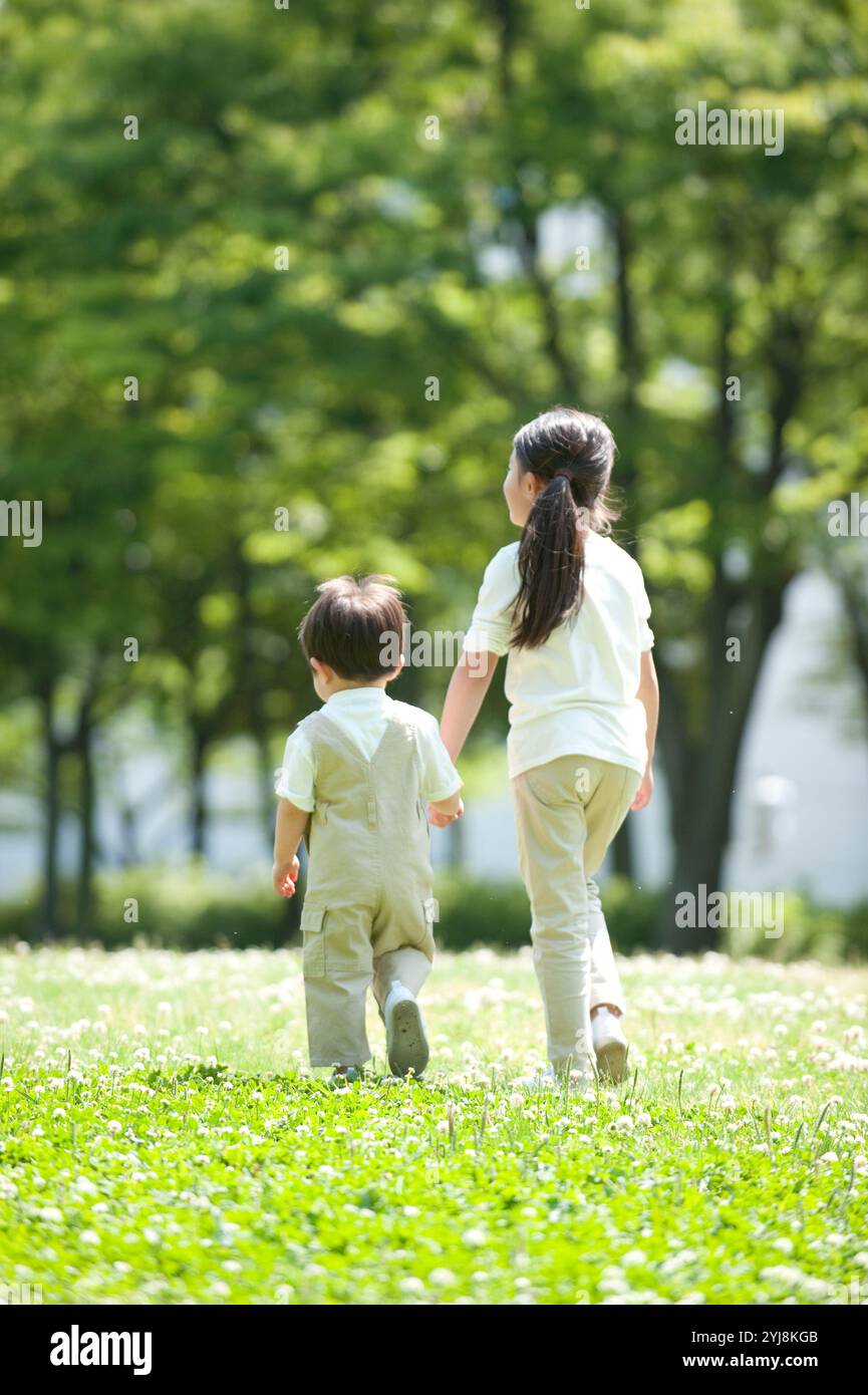 Child rear view park hi-res stock photography and images - Alamy
