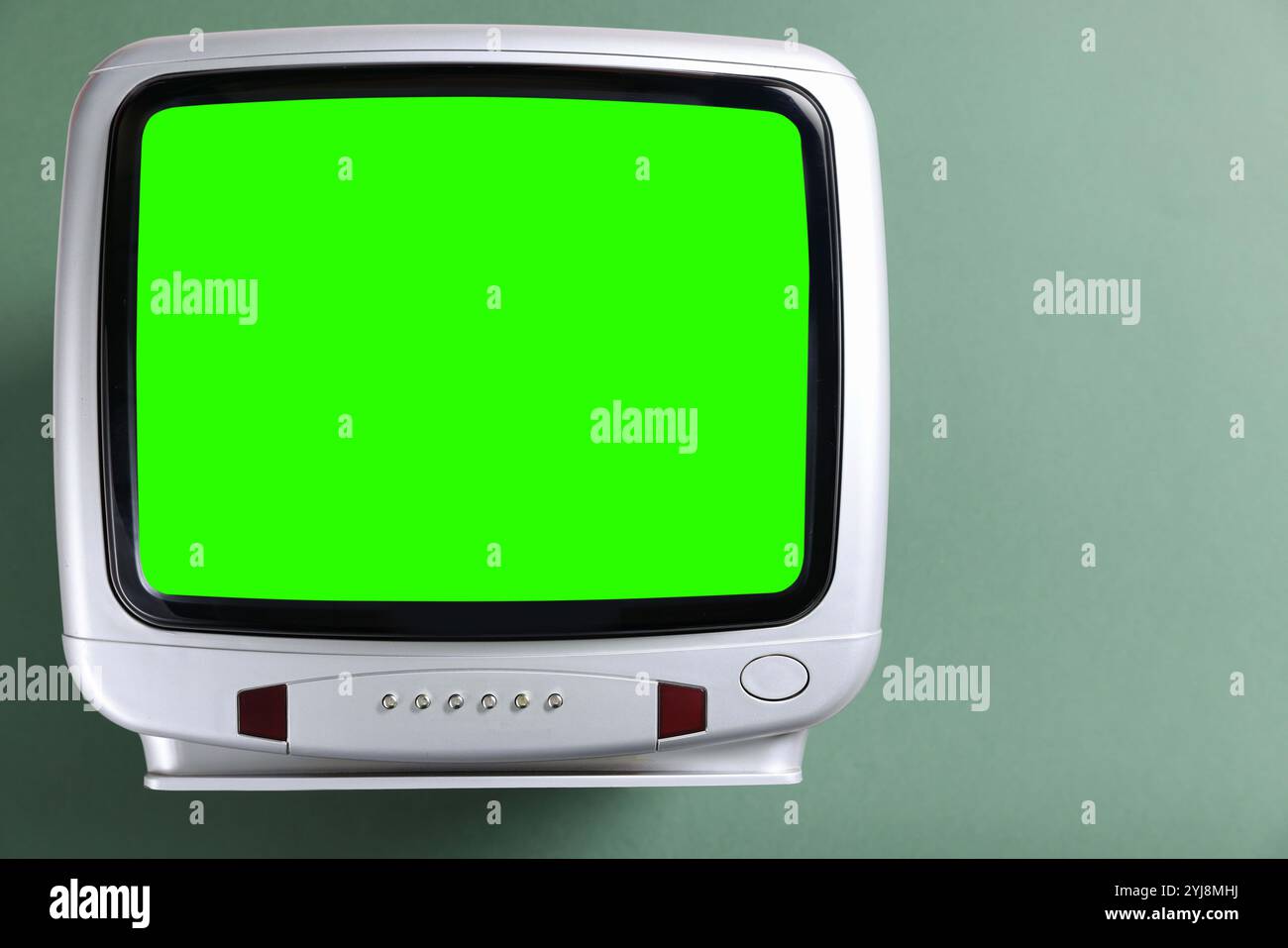 Retro Tv set with green screen on color background, space for design ...