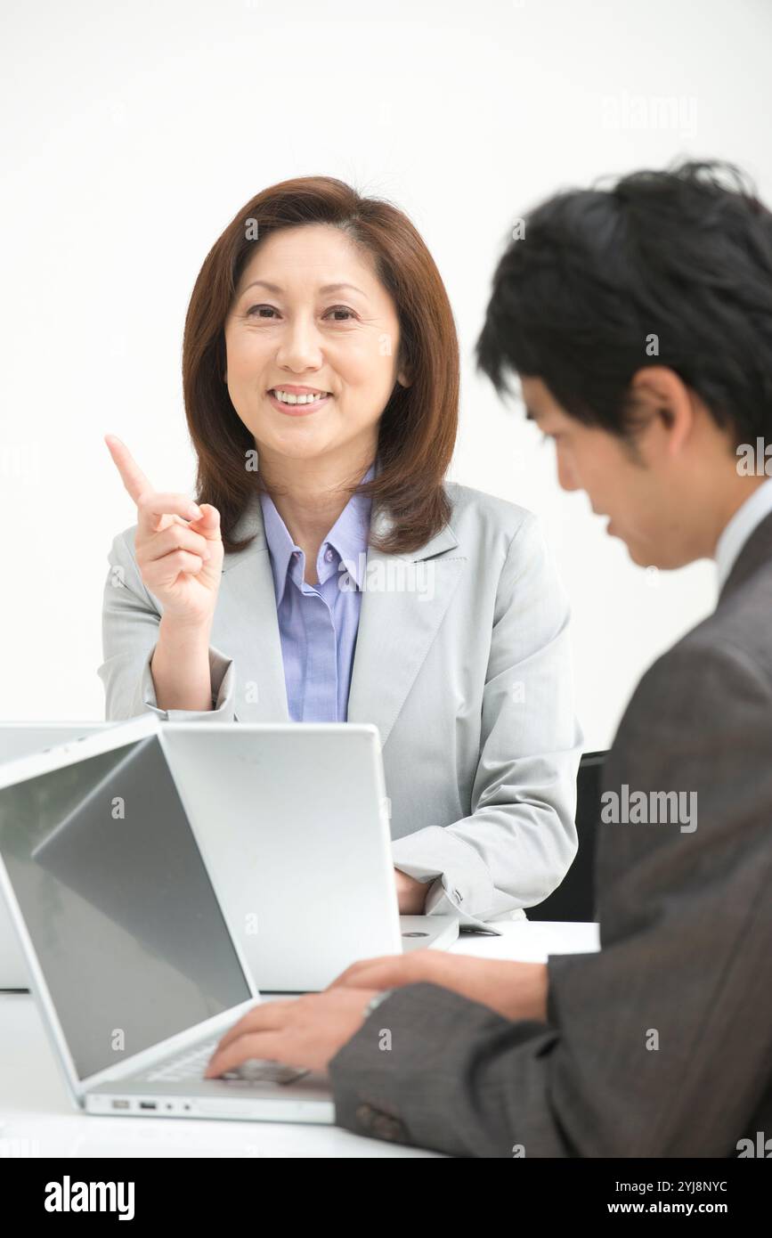 Two men business lift hi-res stock photography and images - Alamy