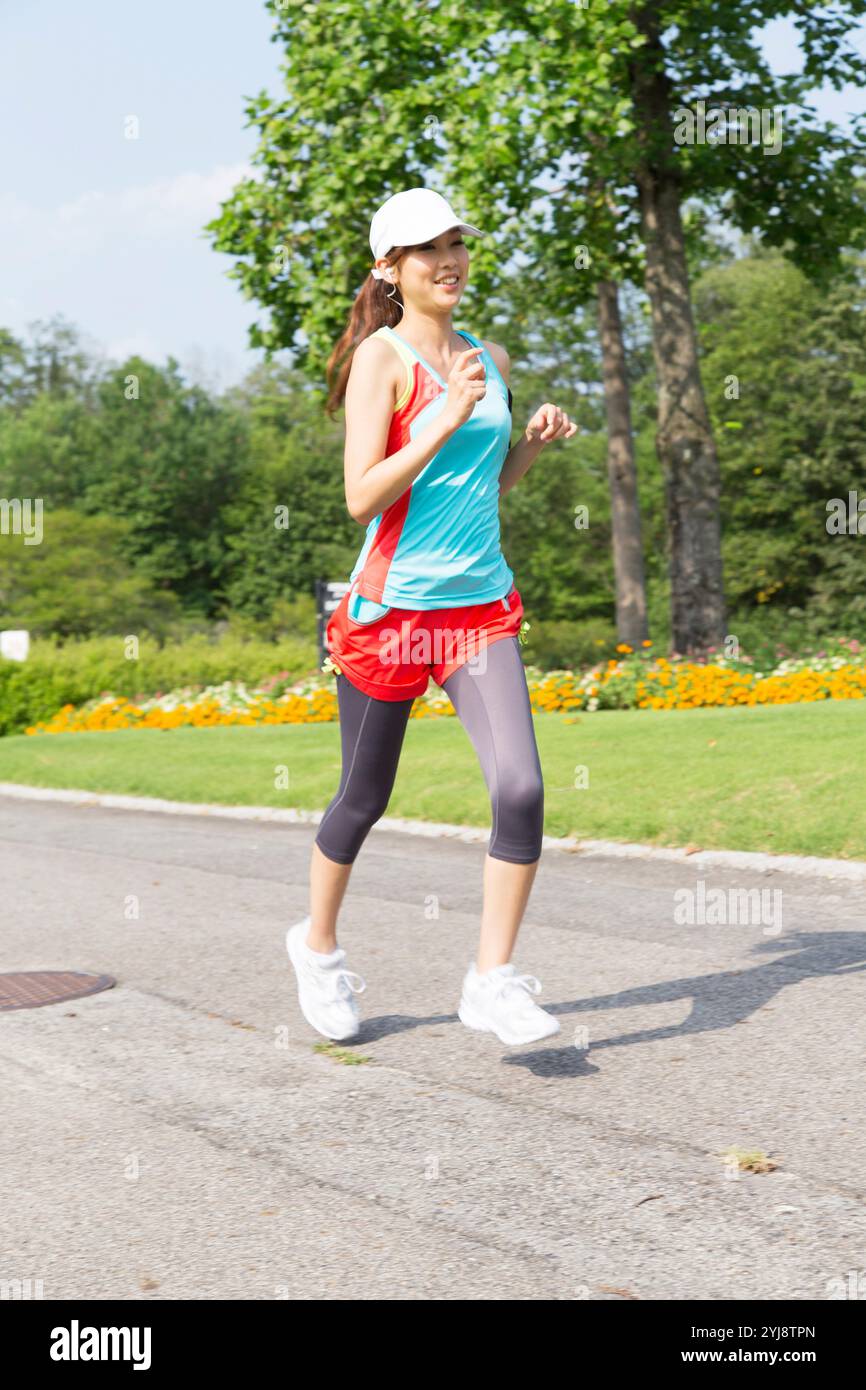 Young person jogging hi-res stock photography and images - Alamy