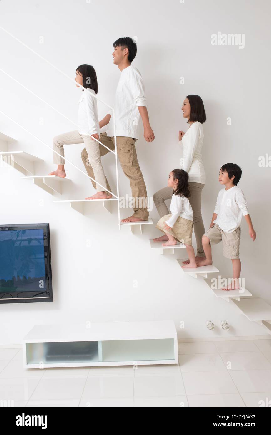 Mother climbing stairs hi-res stock photography and images - Alamy