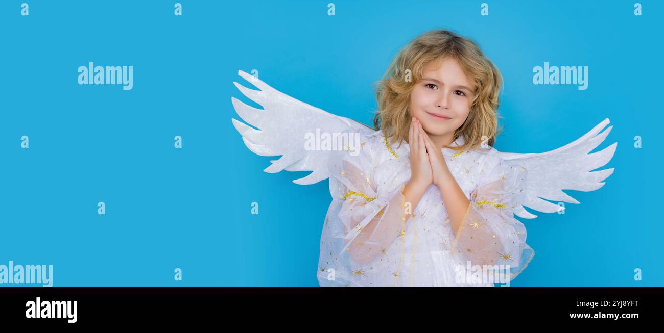 Child angel. Portrait of cute kid with angel wings isolated on studio ...