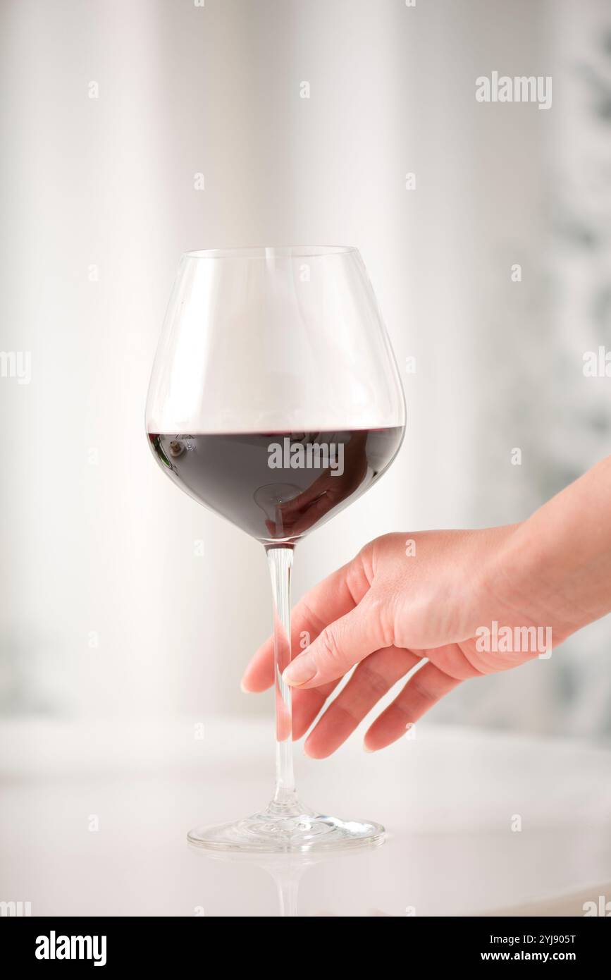 Hand drinking wine hi-res stock photography and images - Alamy