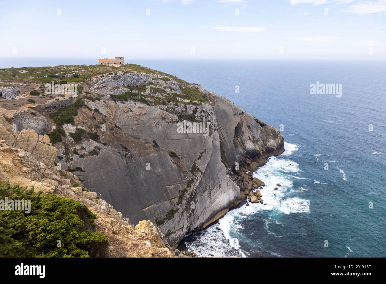 Spectacular view of the promontory plateau seen from the Cape Espichel Lighthouse built in 1790 ...