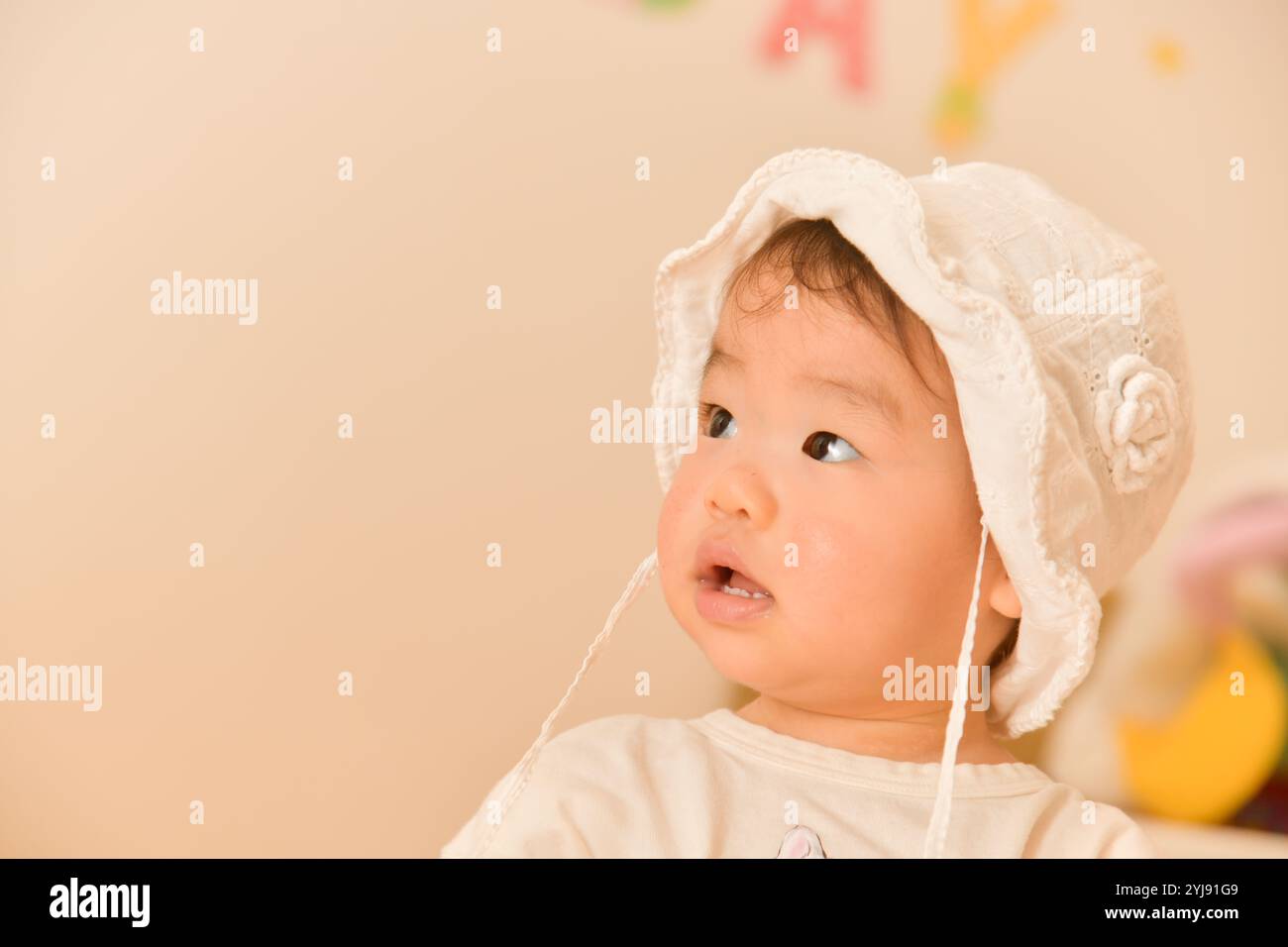Toddler with a pouting expression Stock Photo - Alamy