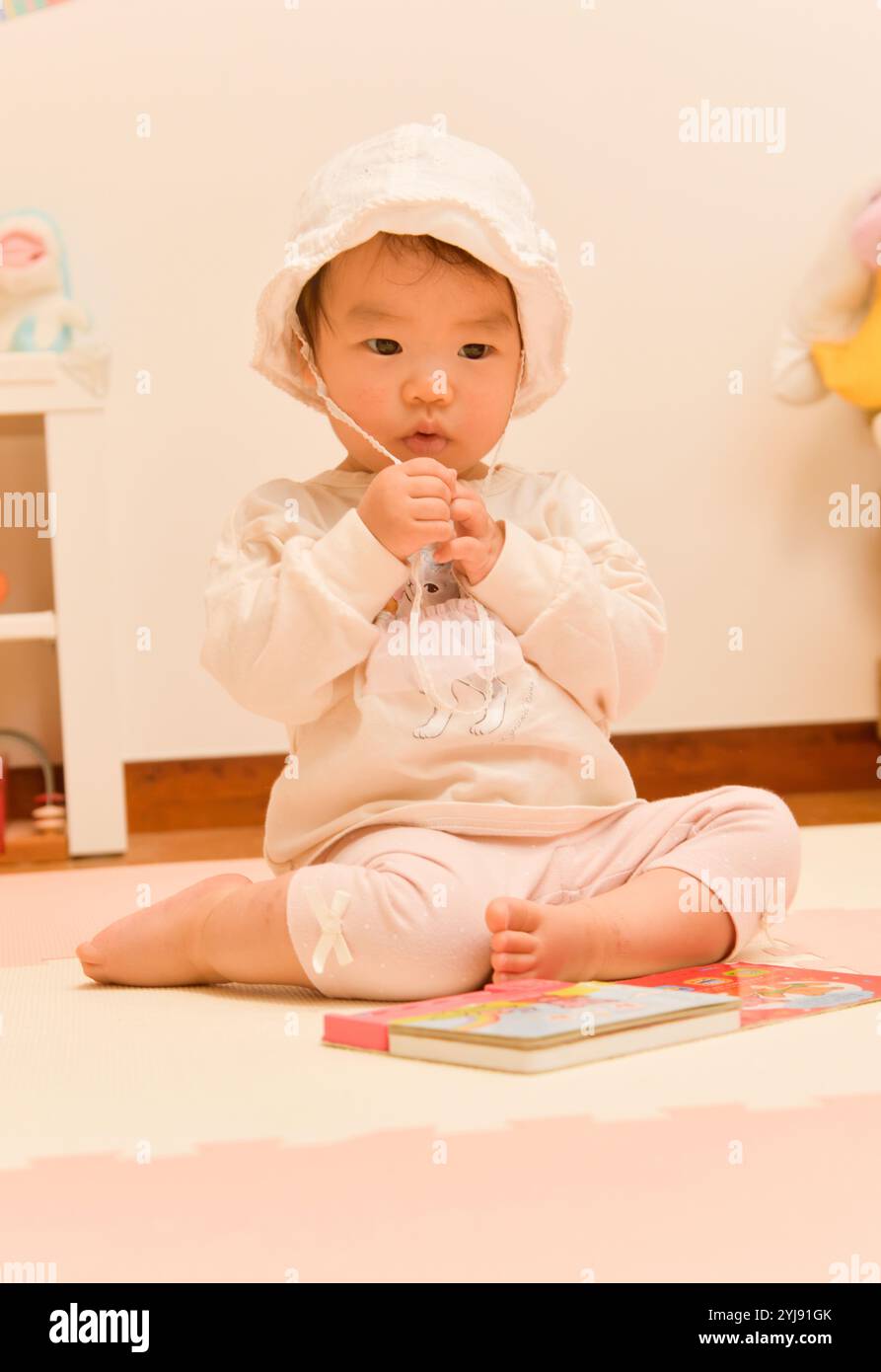 Young child thinking Stock Photo - Alamy