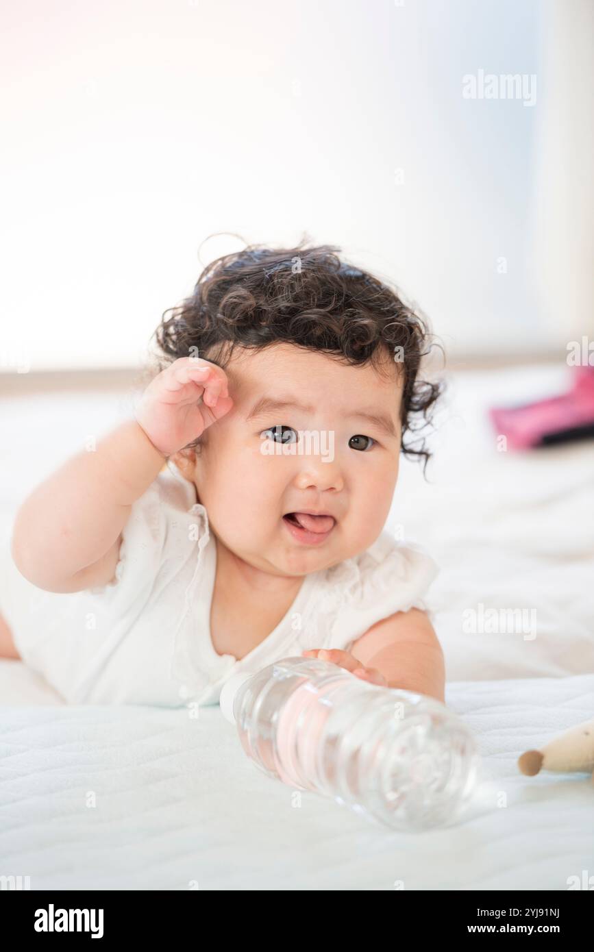 Six-month-old baby with crying face Stock Photo - Alamy